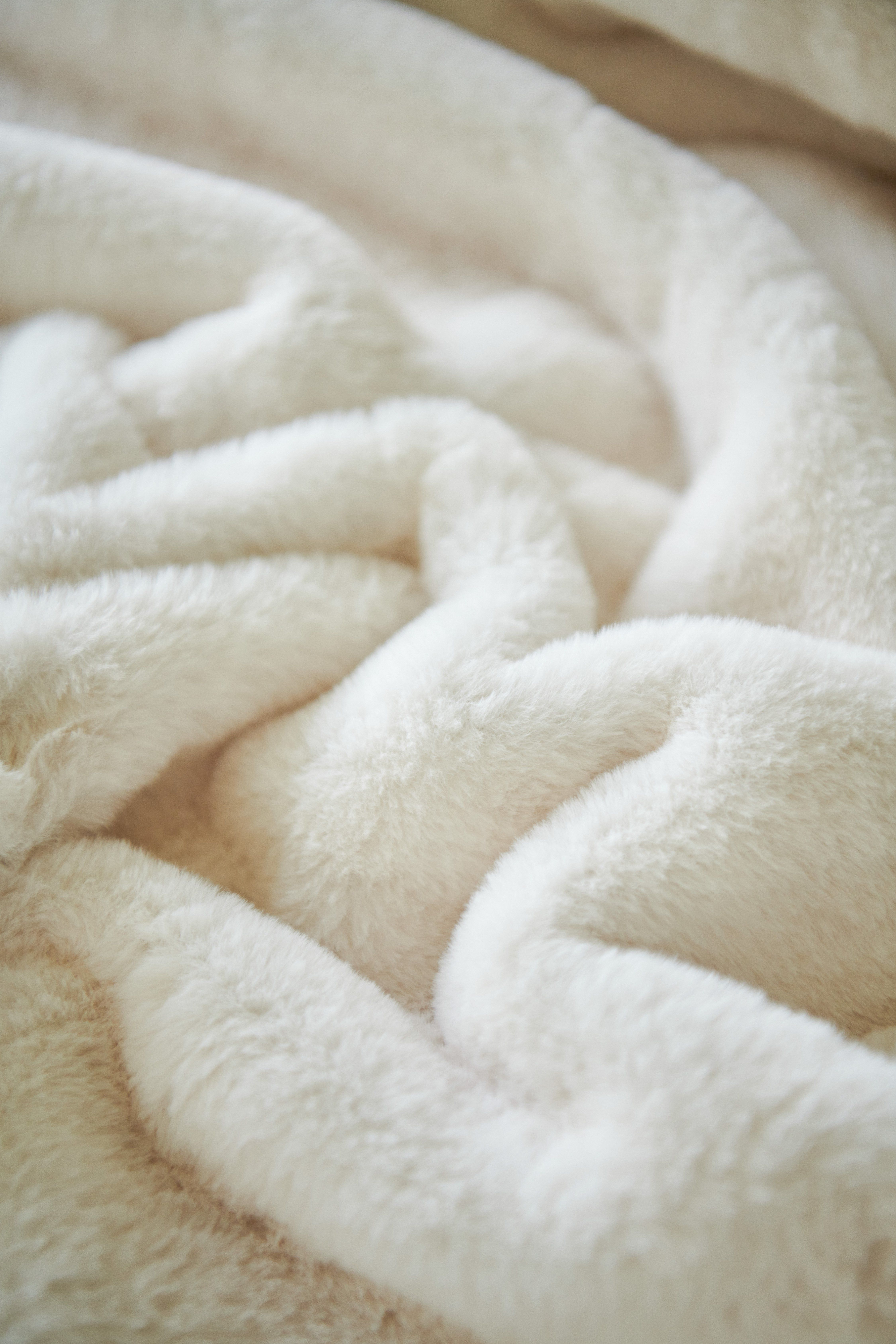 Cozy Beige Fleece Blanket Texture Close-Up · Free Stock Photo