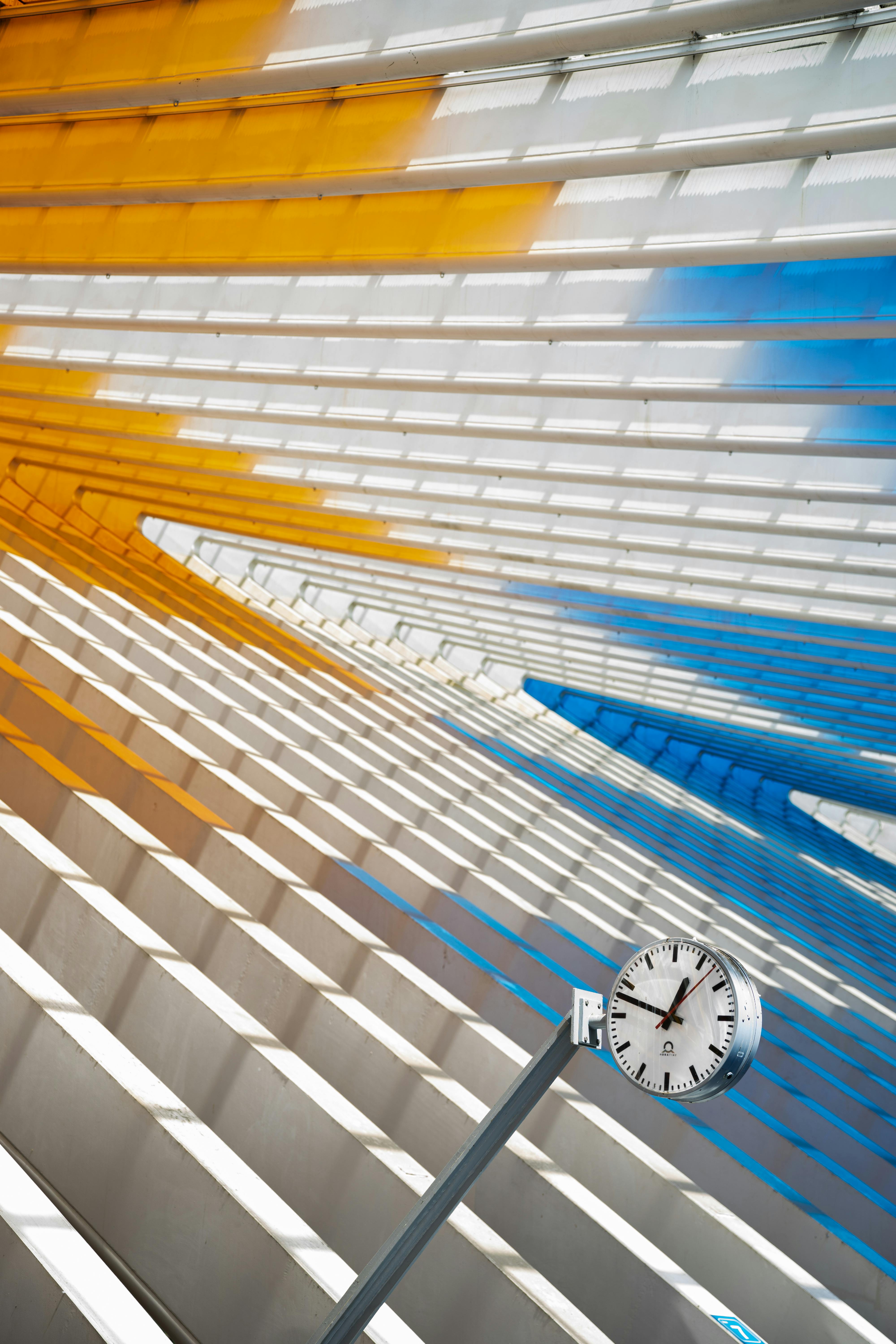 Modern Architectural Design with Clock in Liège · Free Stock Photo