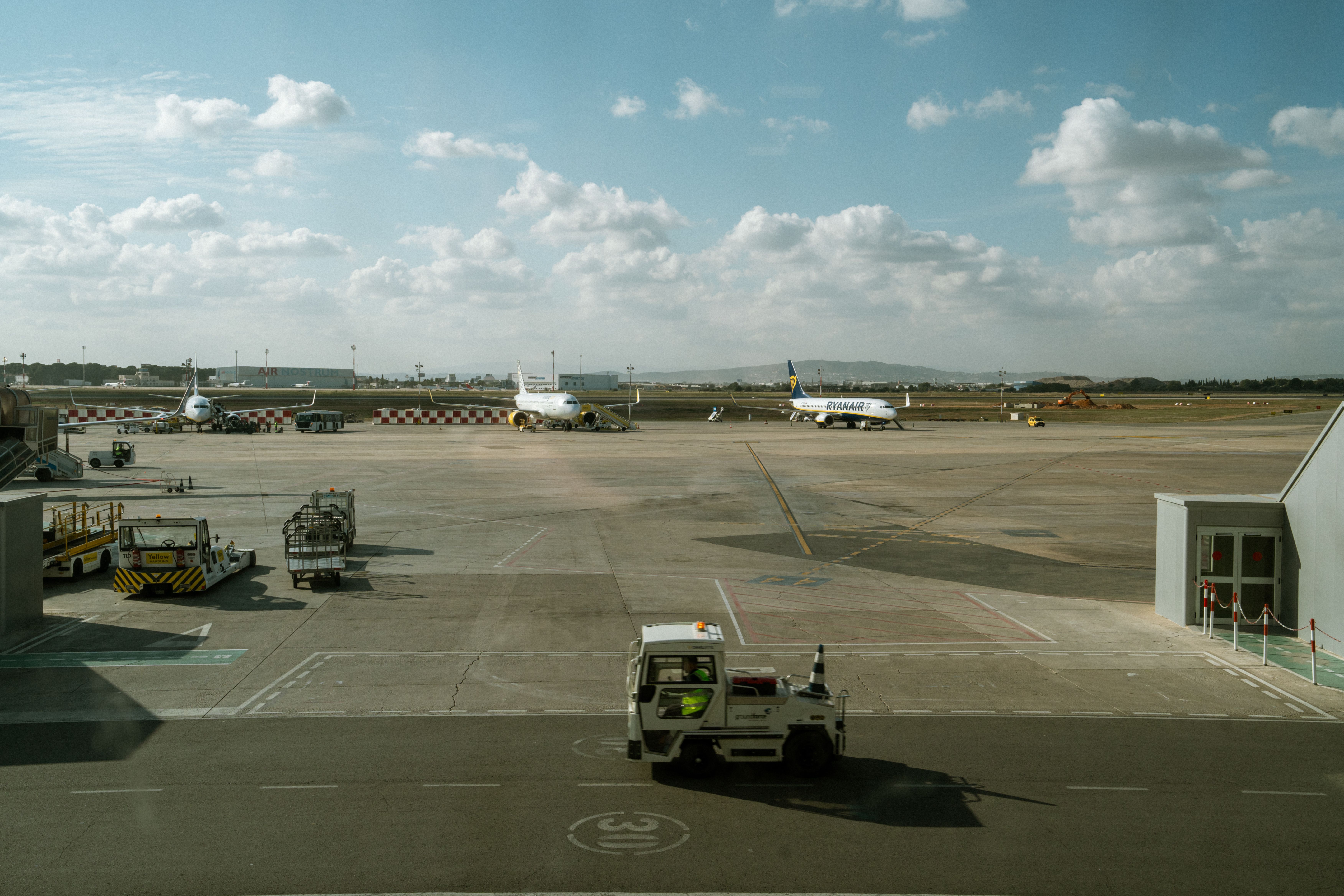 Scenic View of Airport Tarmac with Airplanes · Free Stock Photo