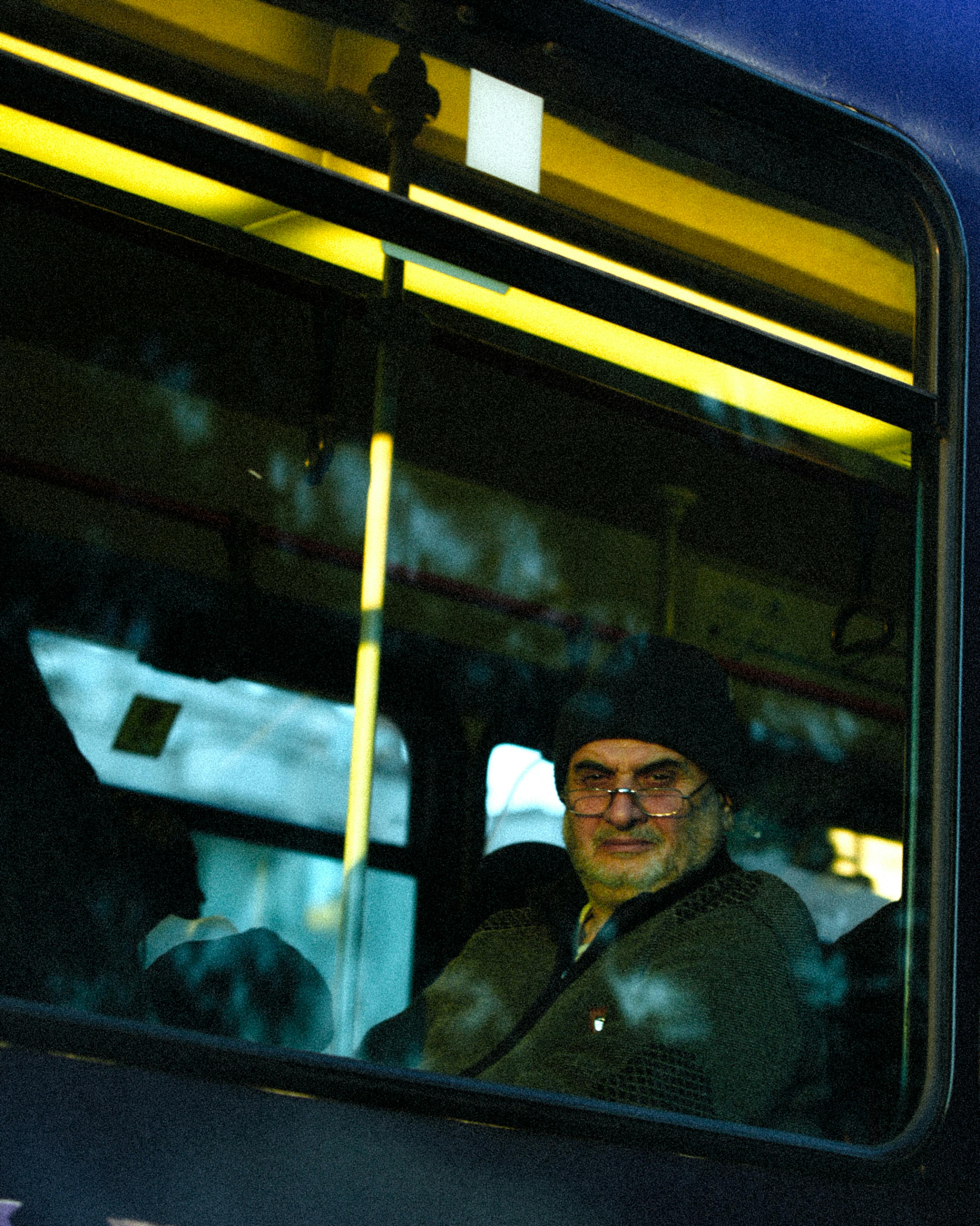 Man Observing Through Bus Window in Gaziantep · Free Stock Photo