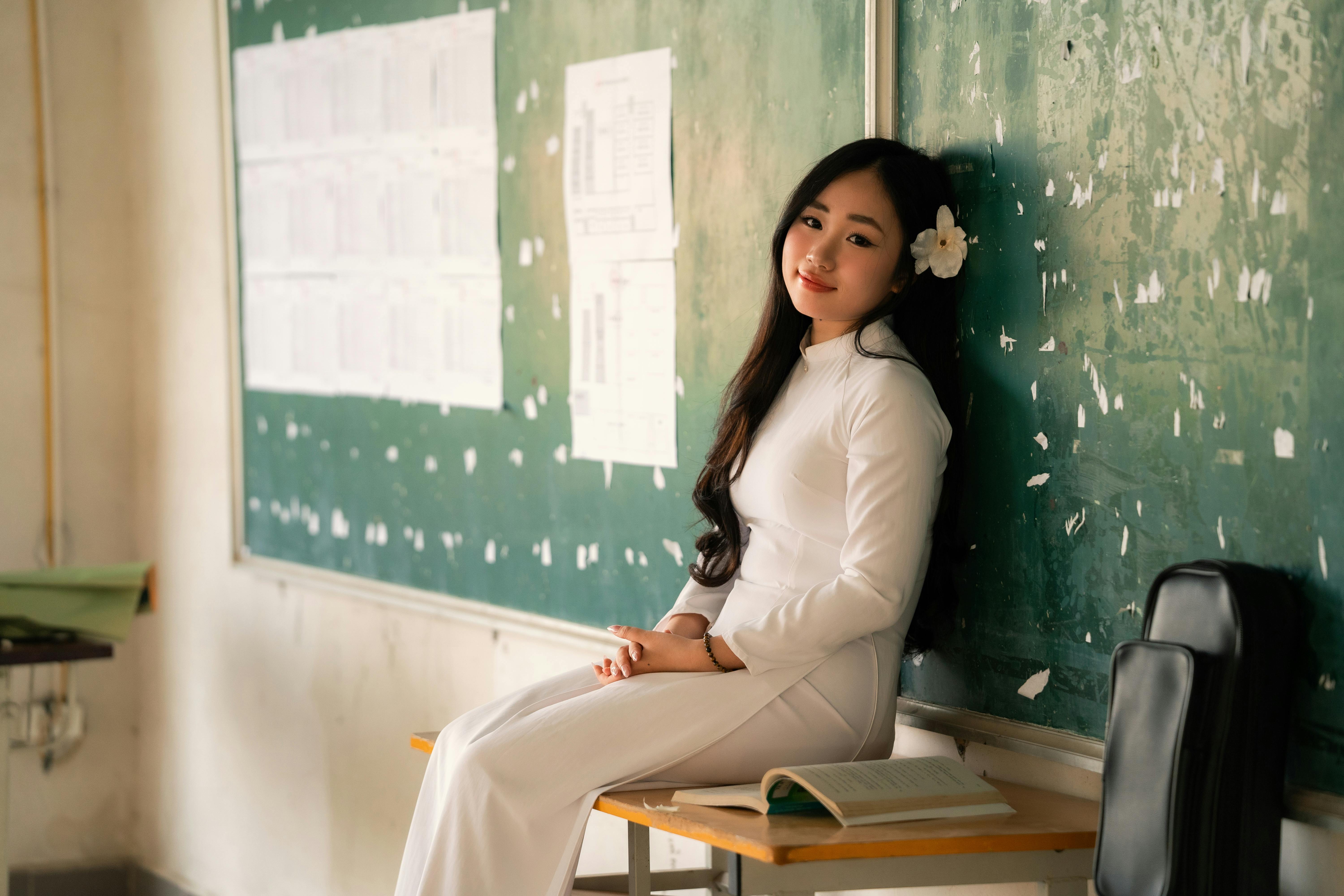 Vietnamese Student in Classroom with Traditional Attire · Free Stock Photo