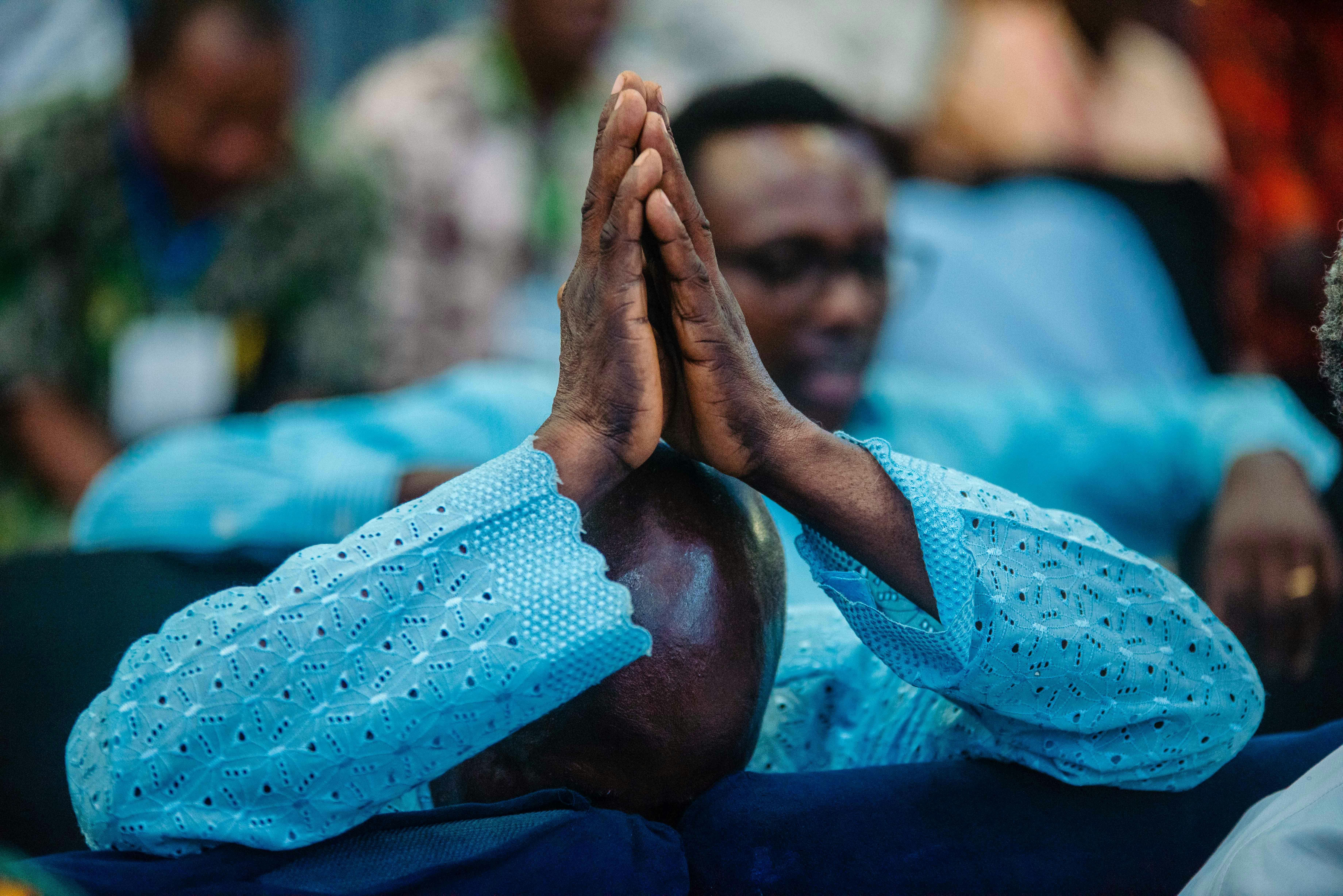 Reflective Prayer in Church Setting · Free Stock Photo