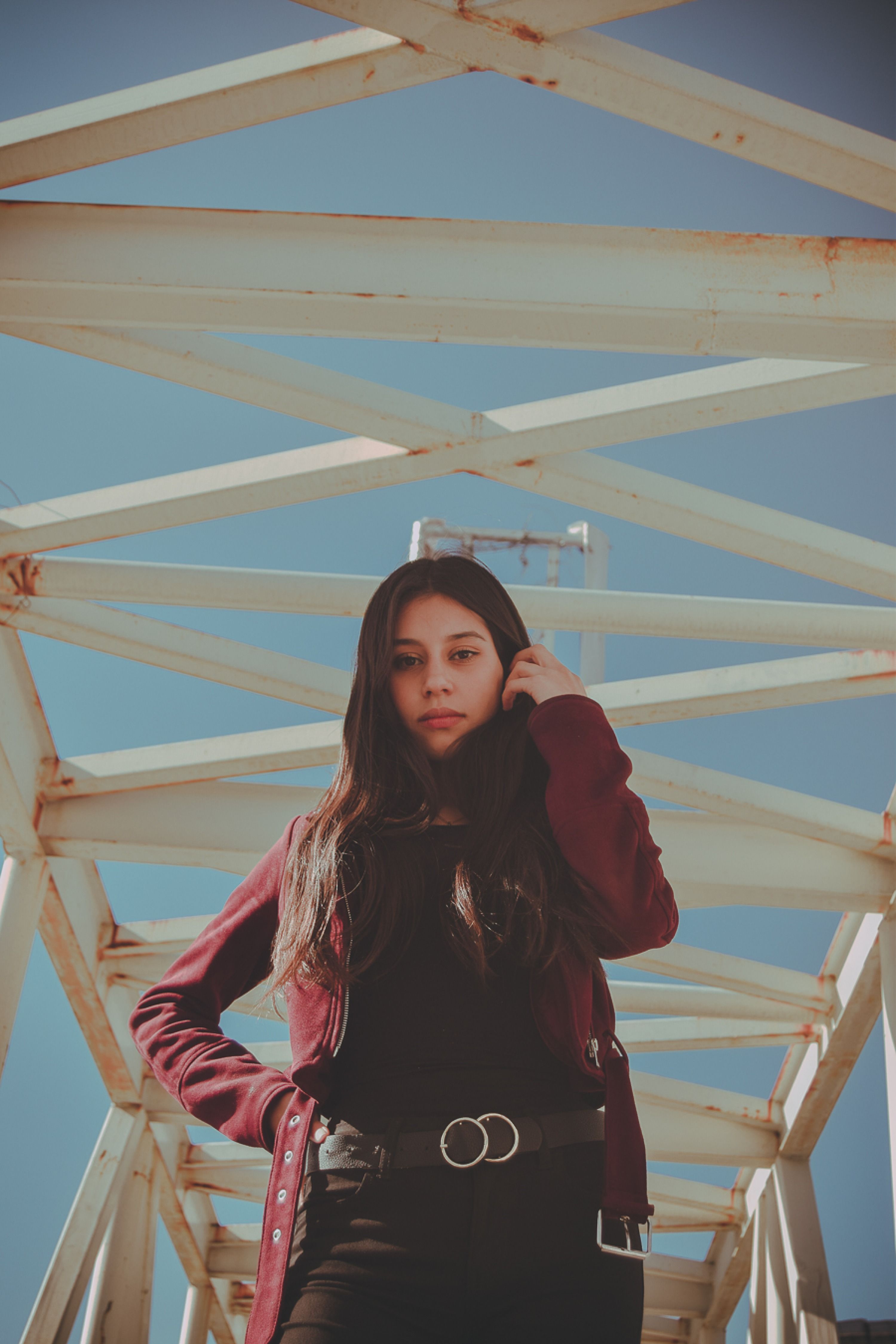 Stylish Young Woman Posing in Modern Structure · Free Stock Photo