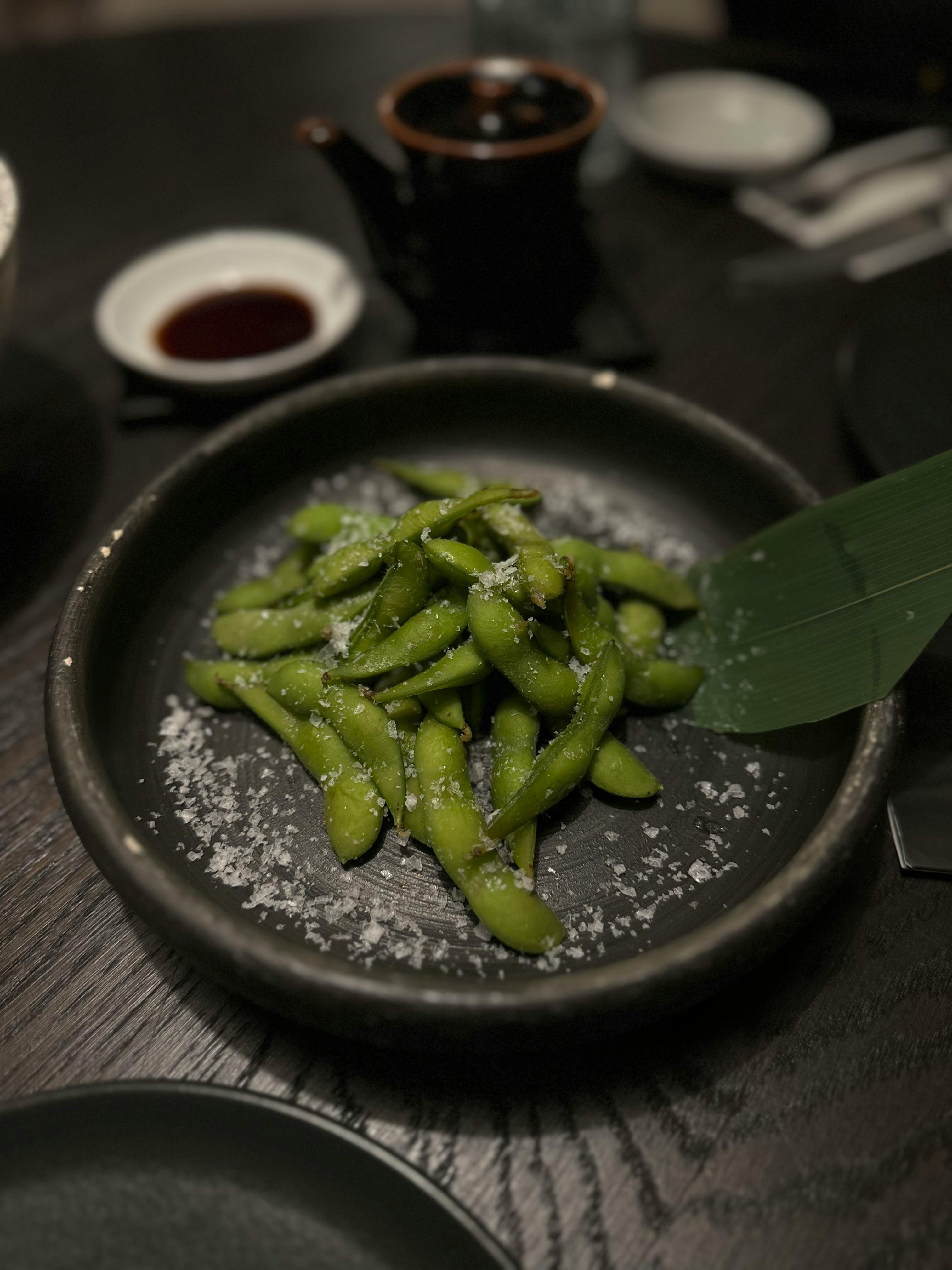 Delicious Salted Edamame Beans in Dark Bowl · Free Stock Photo