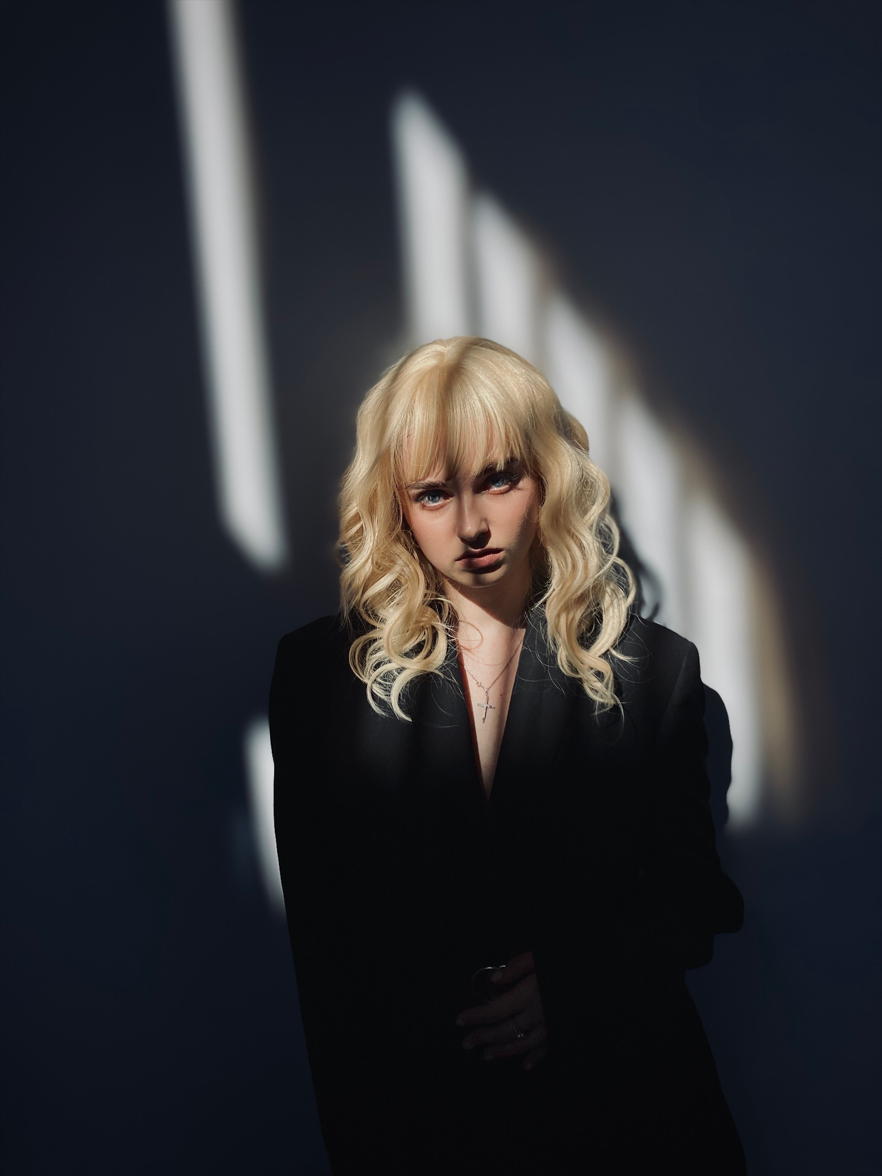 Portrait of Blonde Woman in Dramatic Lighting · Free Stock Photo