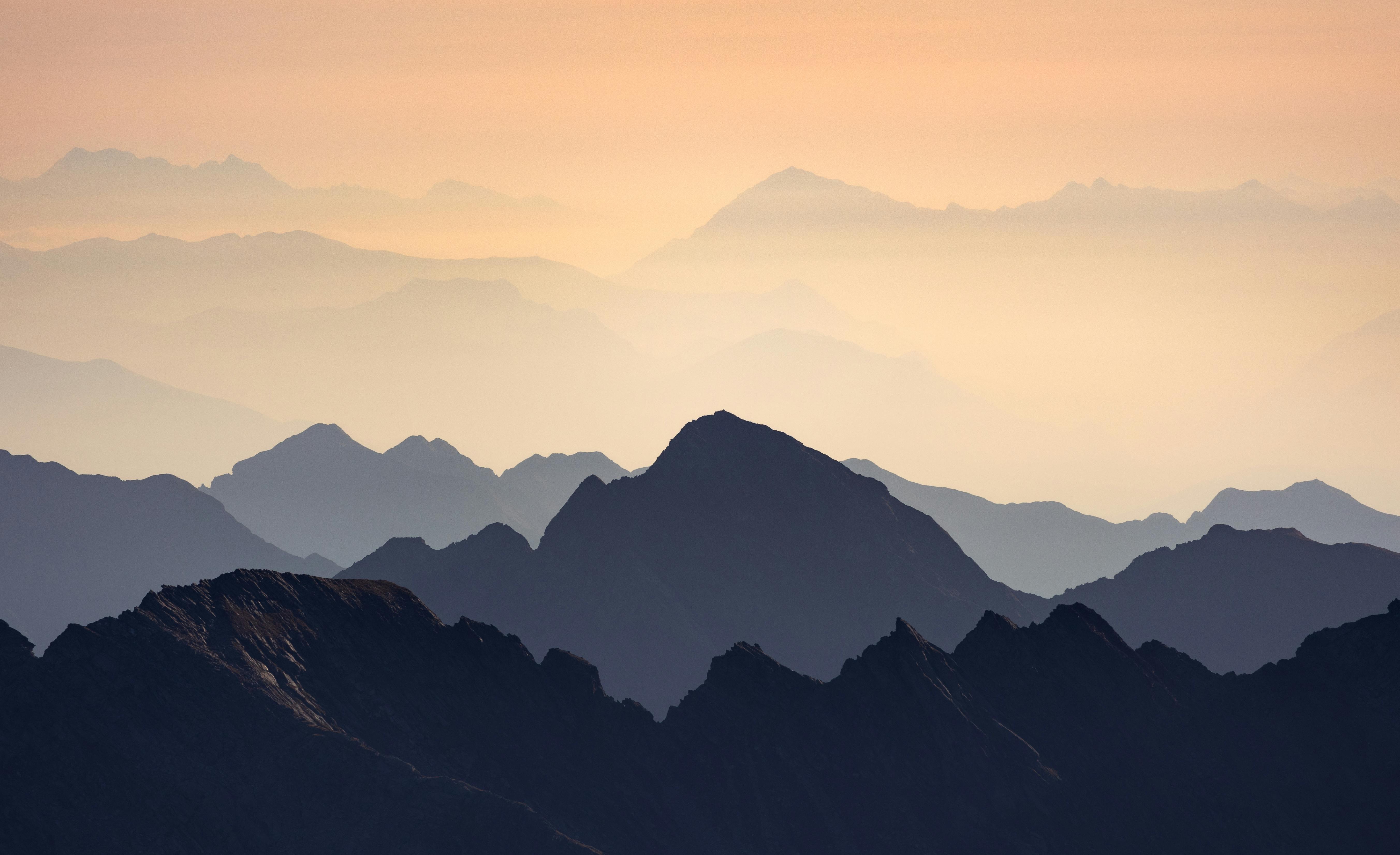 Serene Layered Mountain Landscape at Sunset · Free Stock Photo