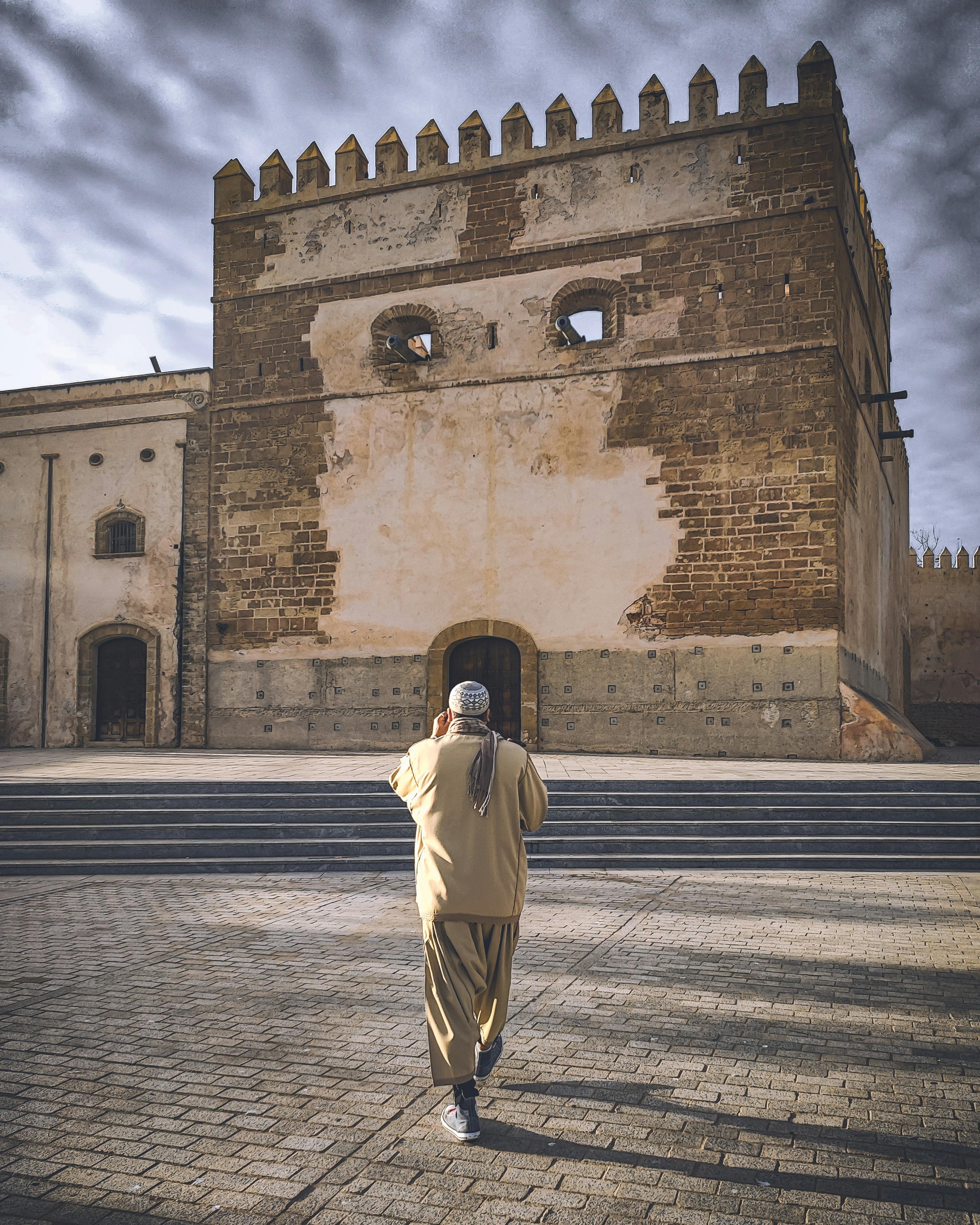 Old Fortification in Rabat with Local Visitor · Free Stock Photo