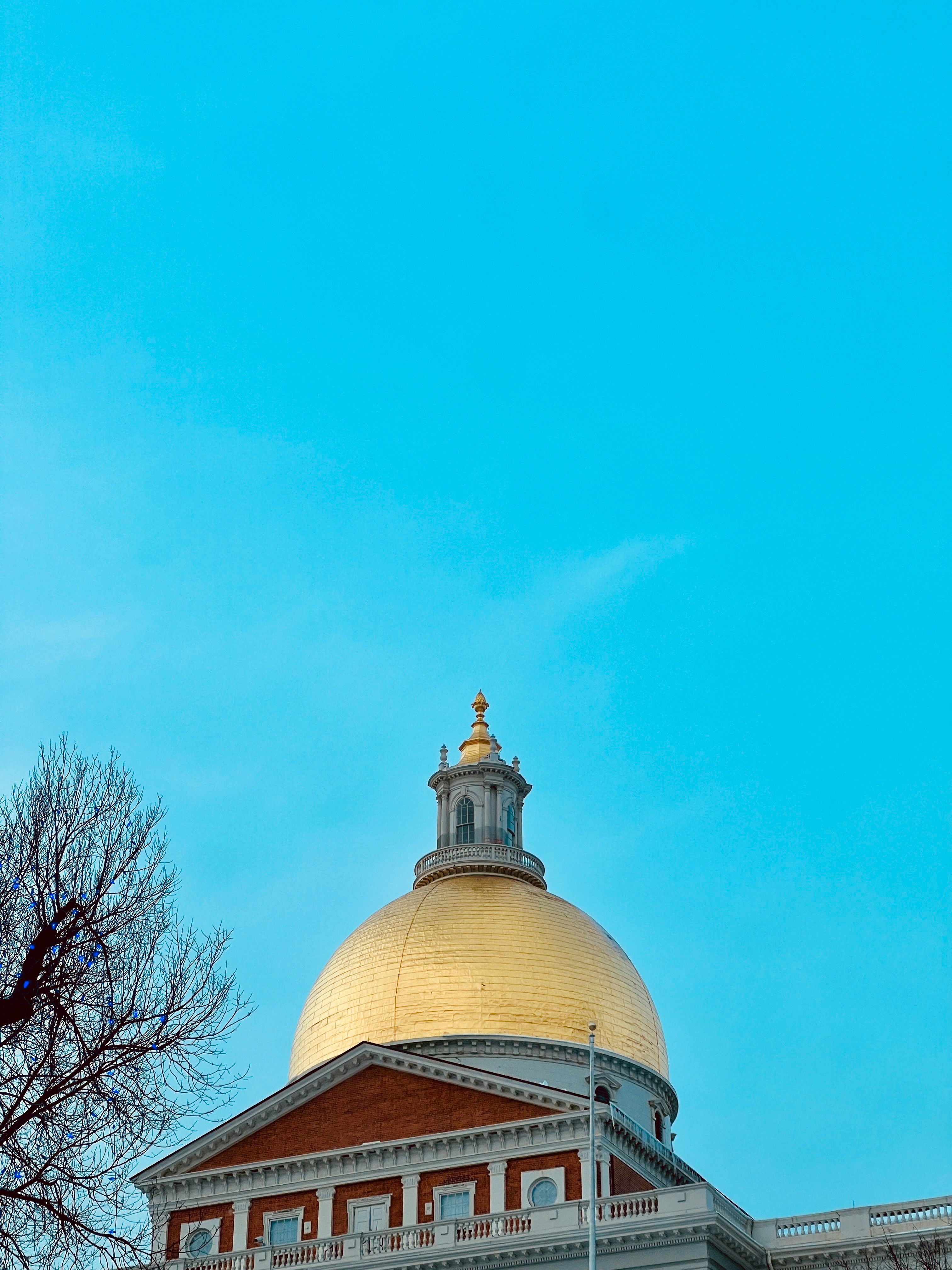 Golden Dome of Historic Building Against Blue Sky · Free Stock Photo