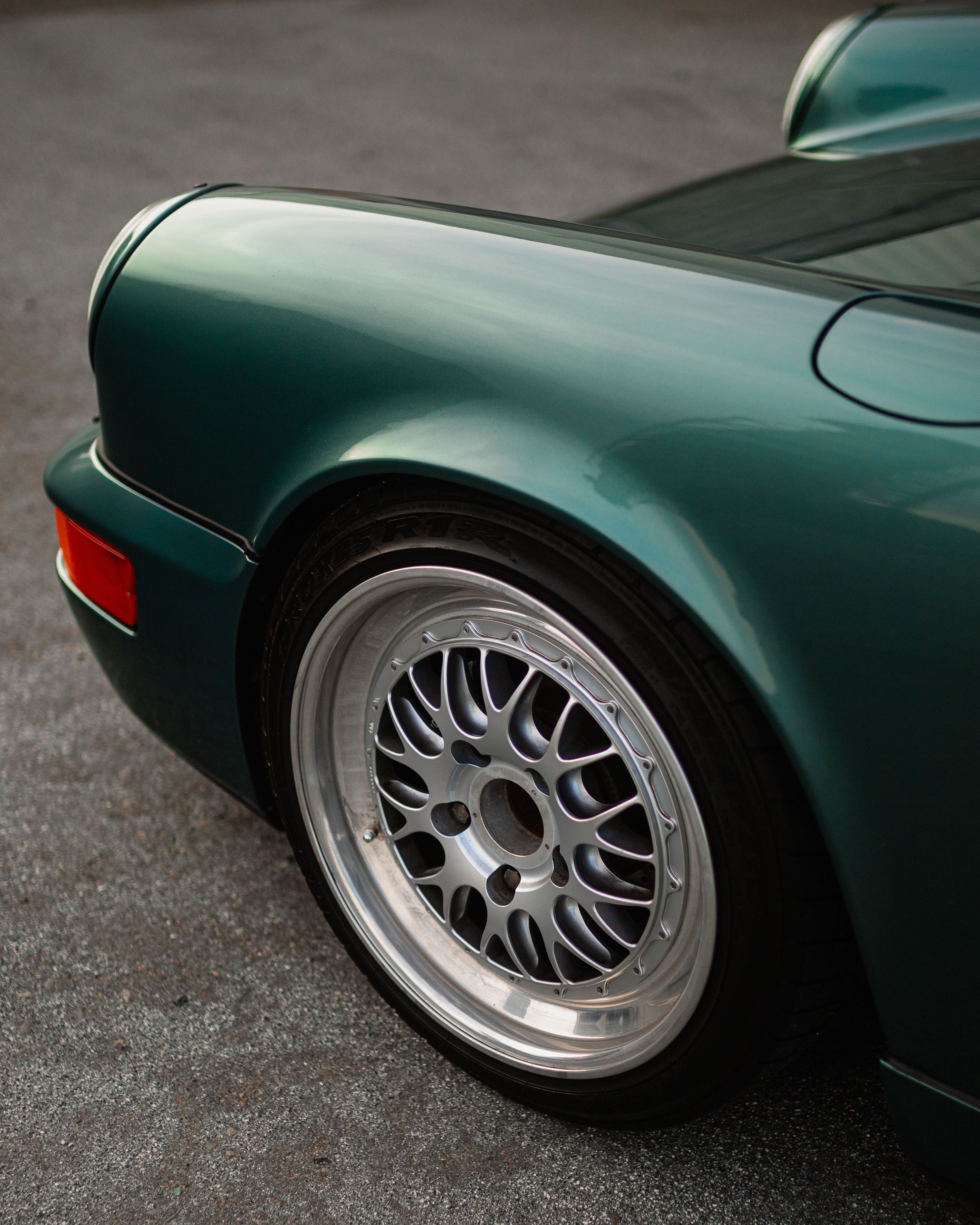 Close-up of Classic Car Wheel on Asphalt · Free Stock Photo