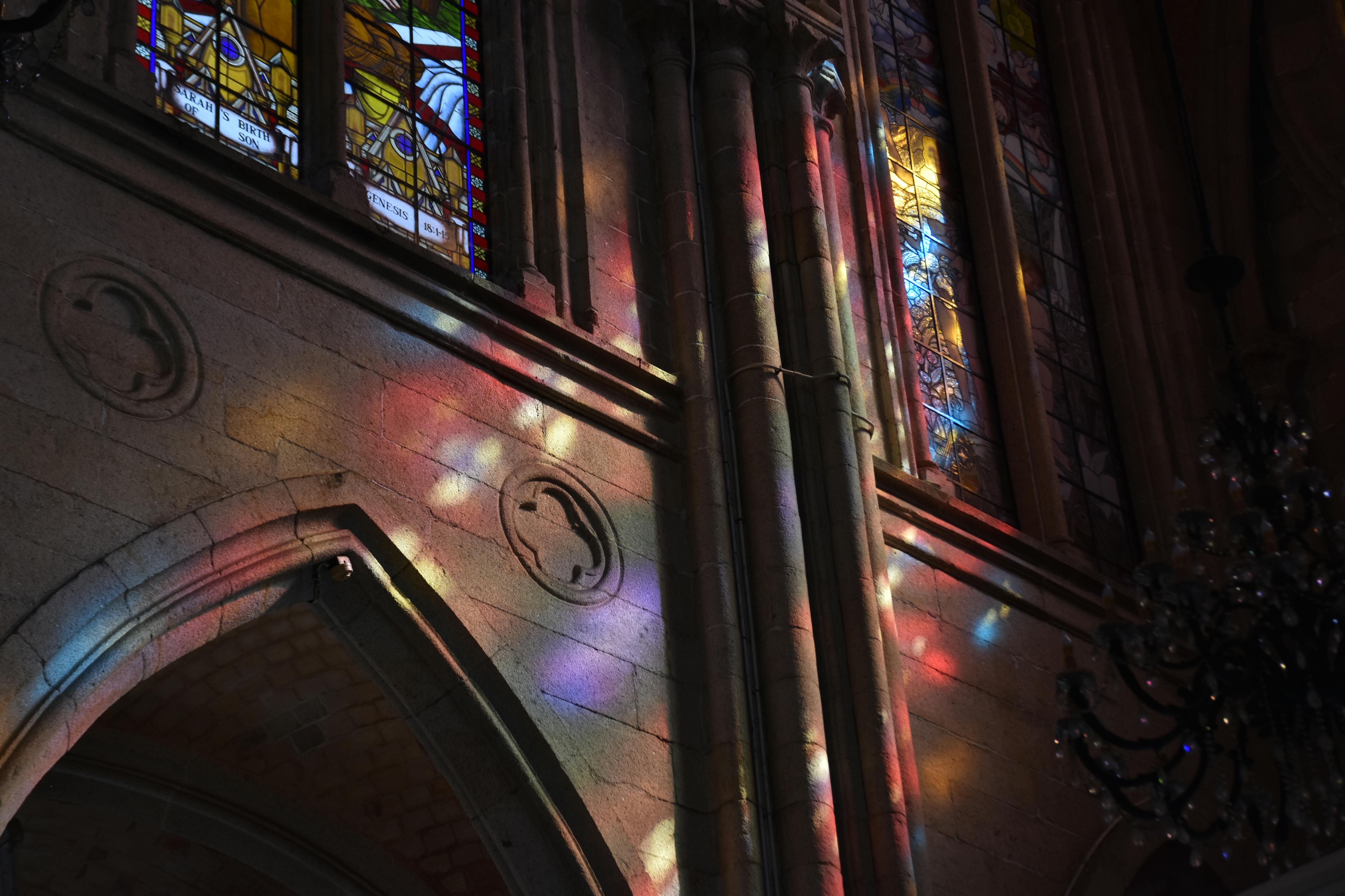 Colorful Stained Glass Reflection in Cathedral · Free Stock Photo