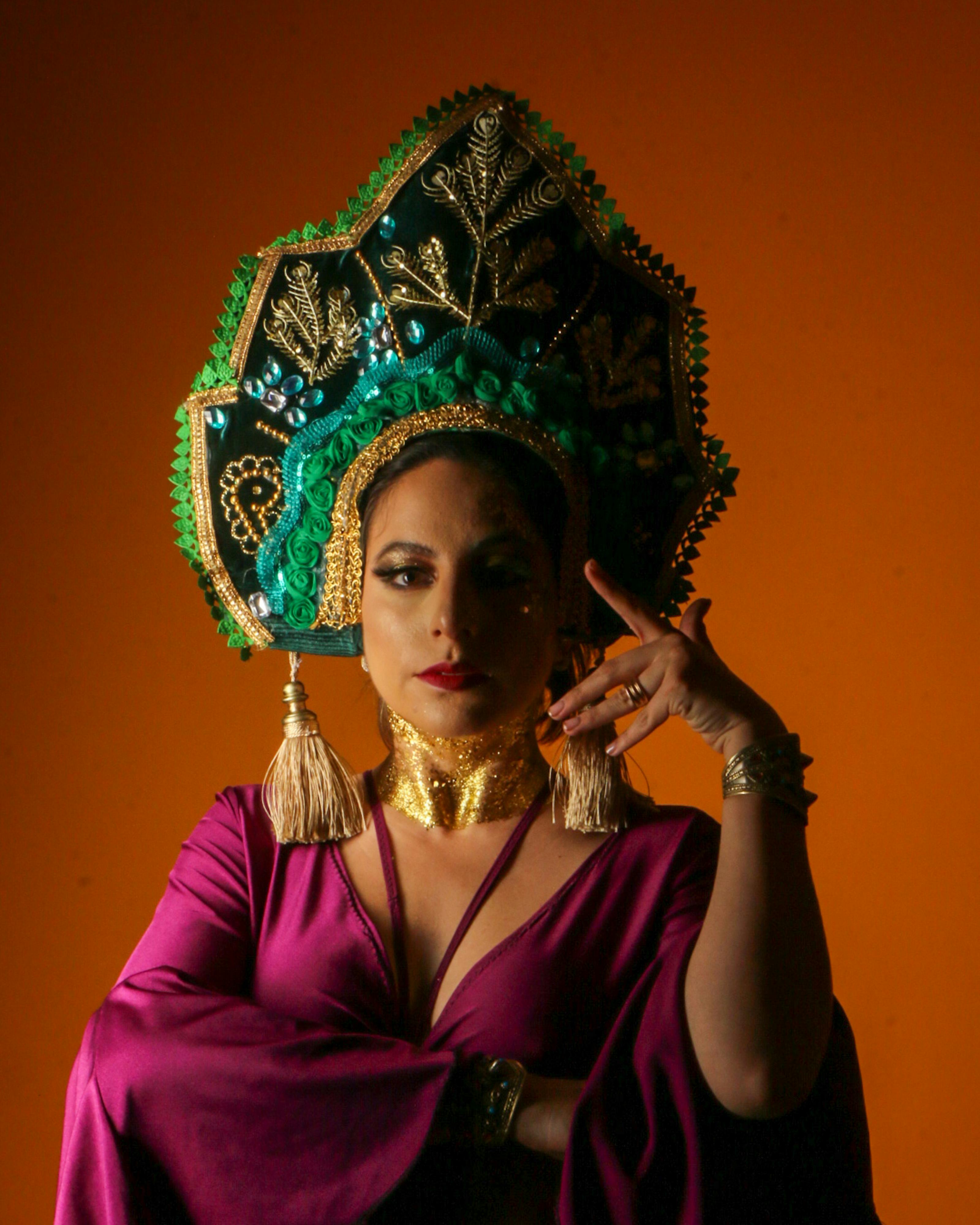 Elegant Portrait of Woman in Traditional Headpiece · Free Stock Photo
