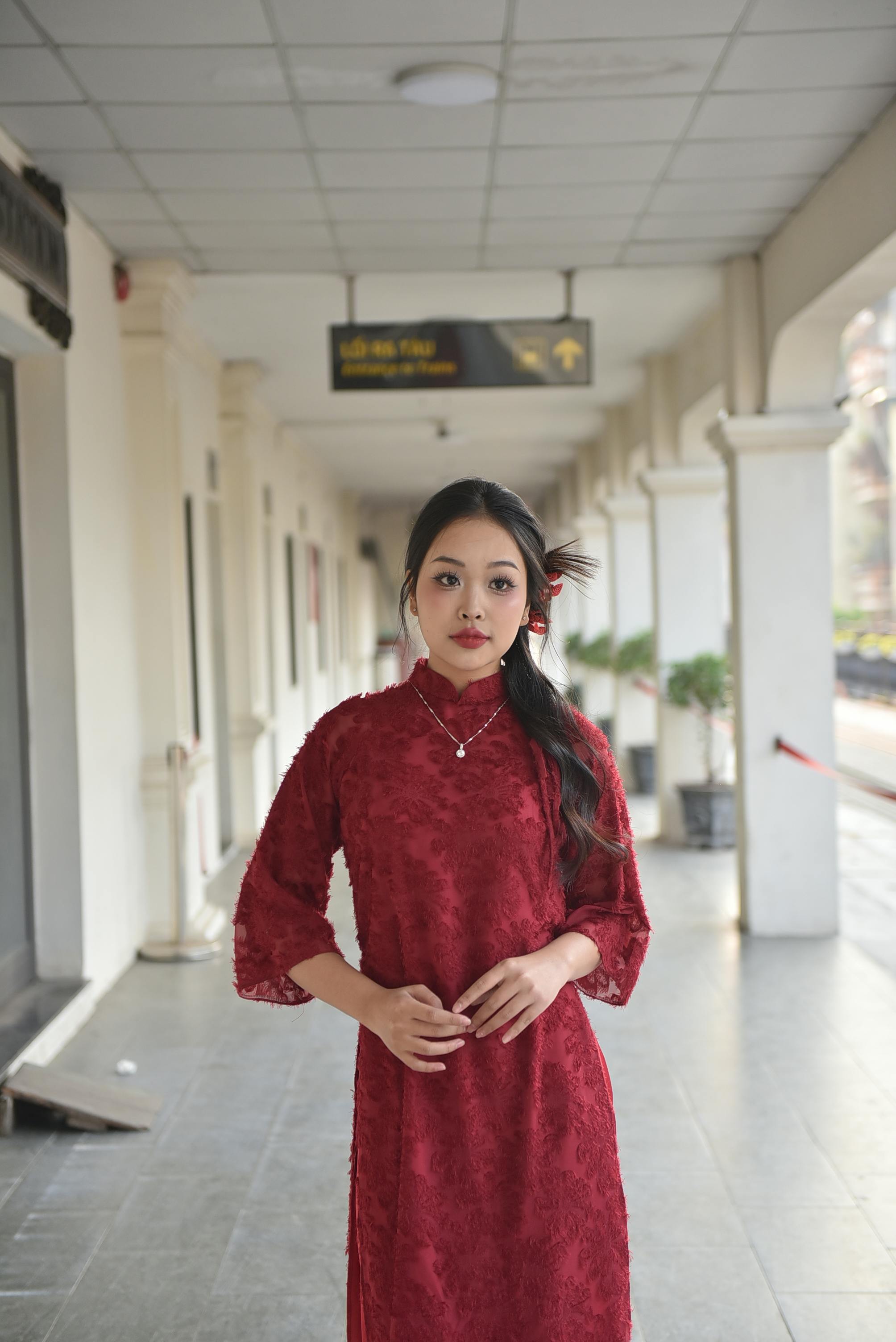 Woman in Traditional Red Asian Dress at Station · Free Stock Photo