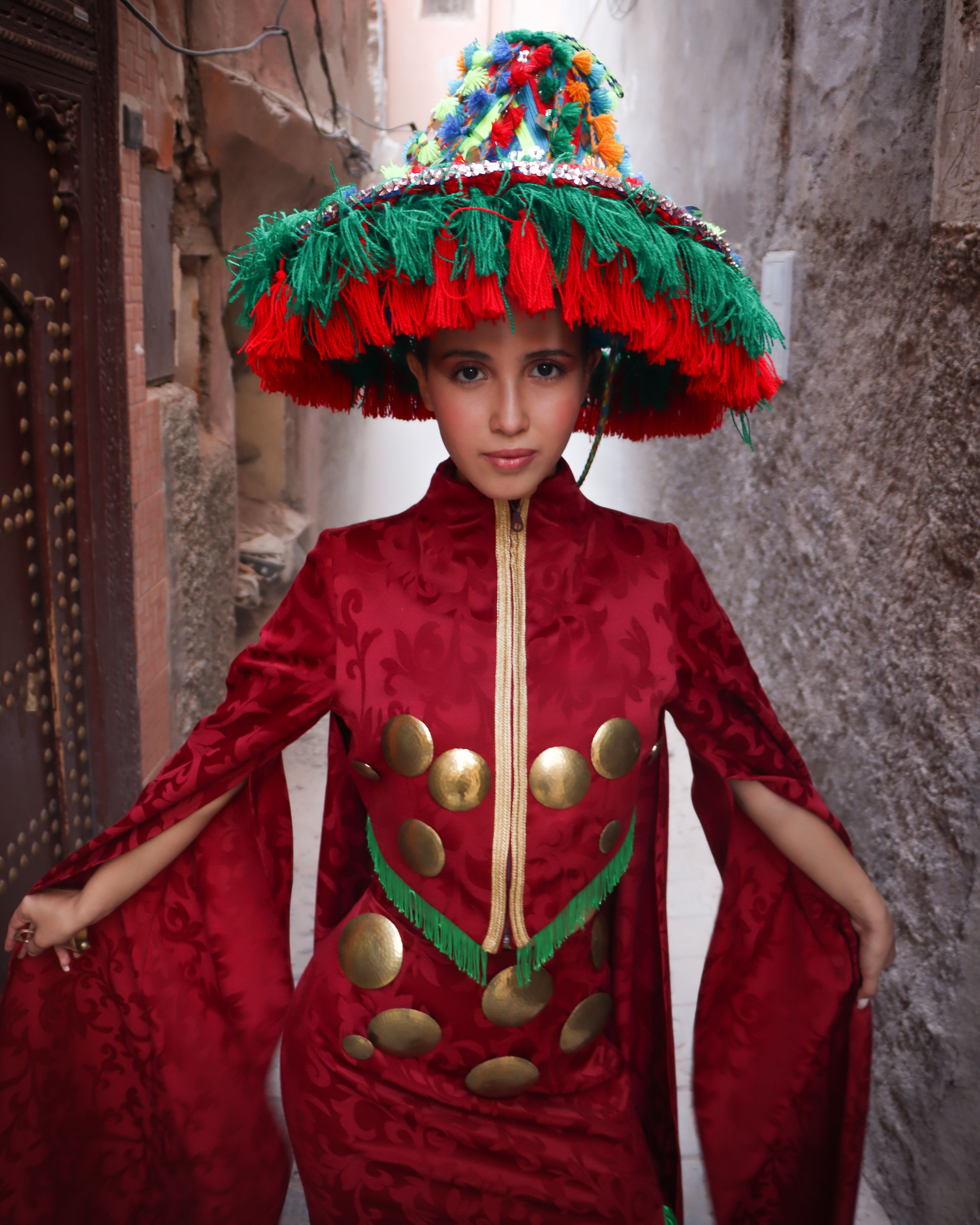 Vibrant Moroccan Fashion in Marrakesh Alleyway · Free Stock Photo
