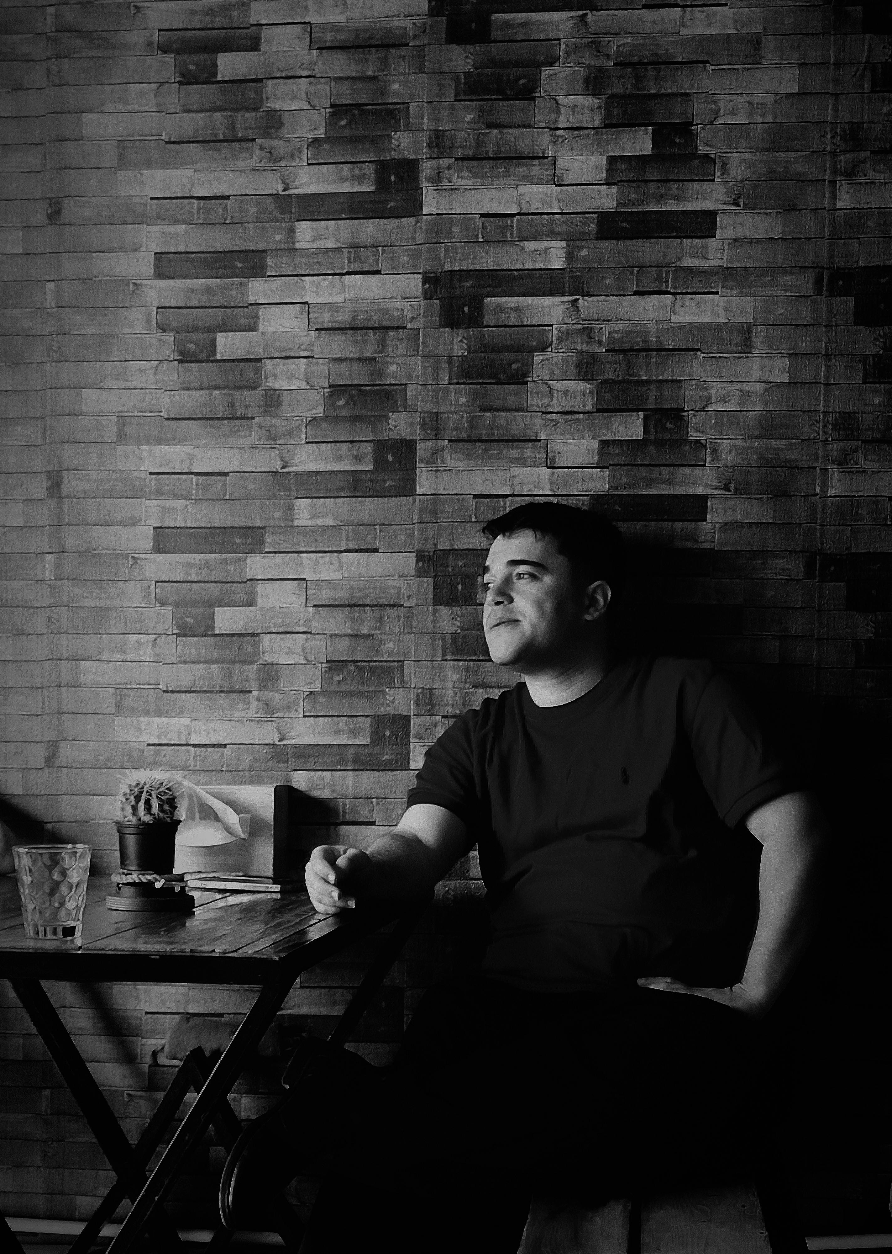Moody Black and White Portrait in Tehran Café · Free Stock Photo