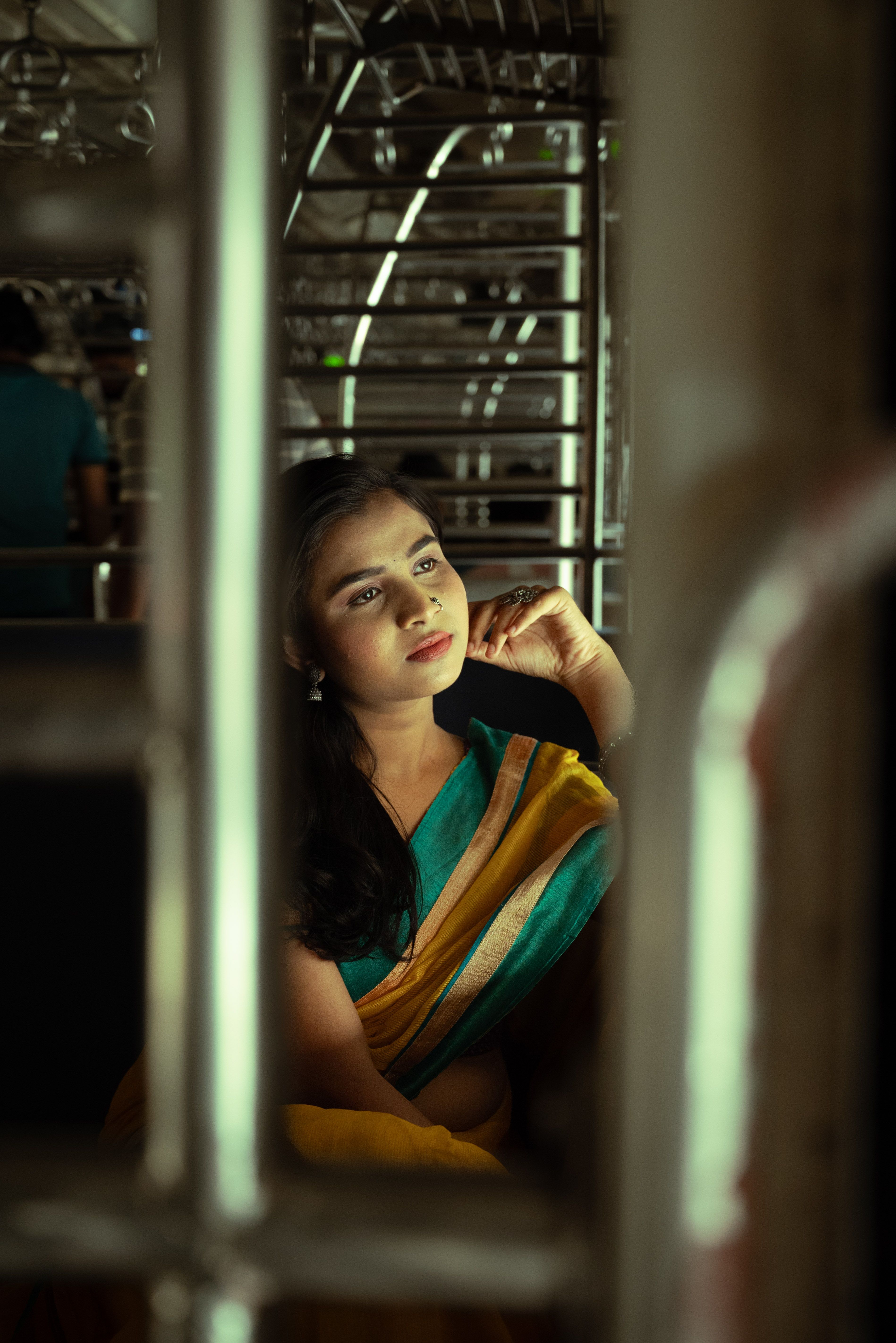 Elegant Woman in Traditional Saree on Mumbai Train · Free Stock Photo