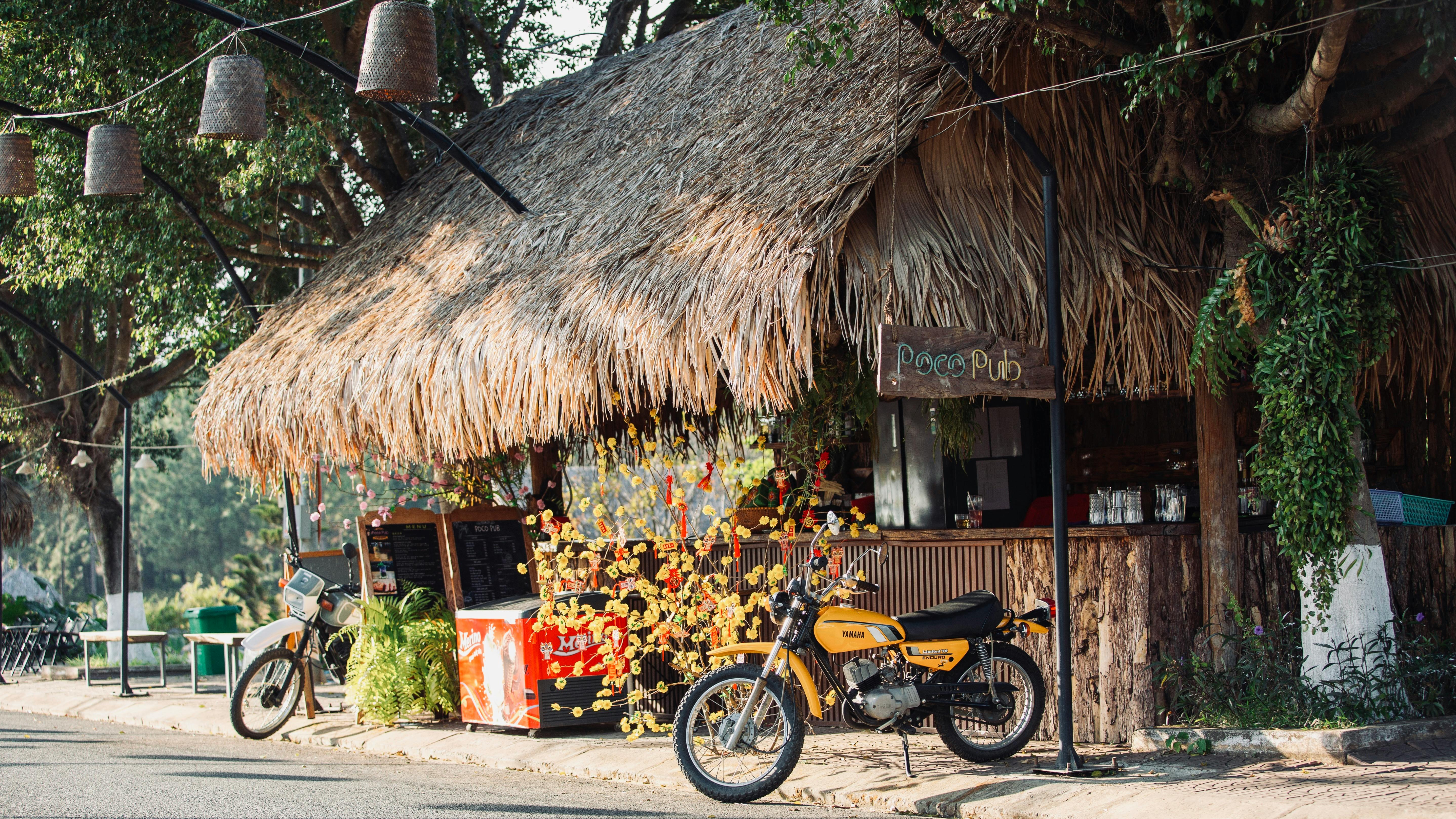 Rustic Vietnamese Street Scene with Motorbikes · Free Stock Photo