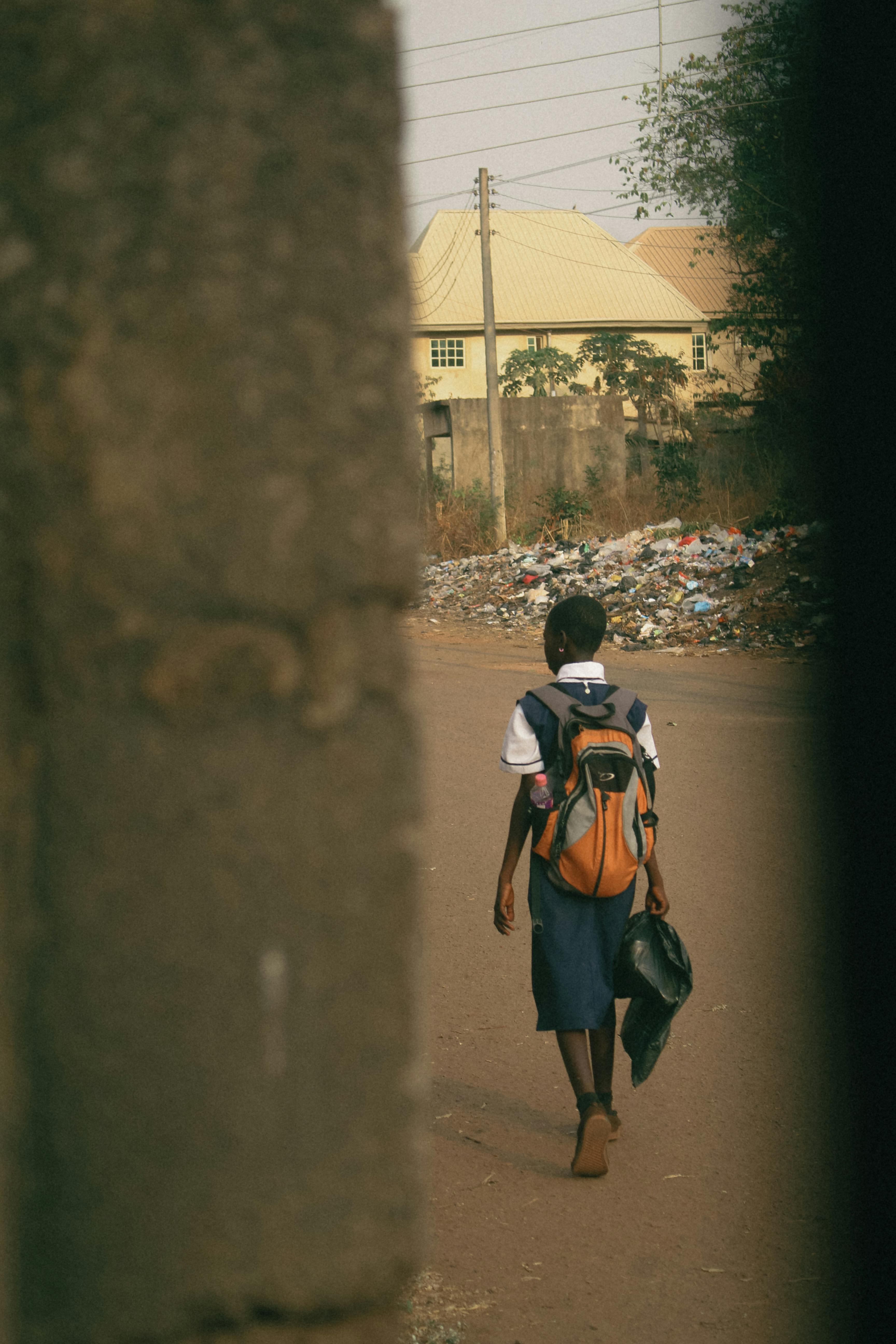 Child Walking Home in Enugu Nigeria · Free Stock Photo
