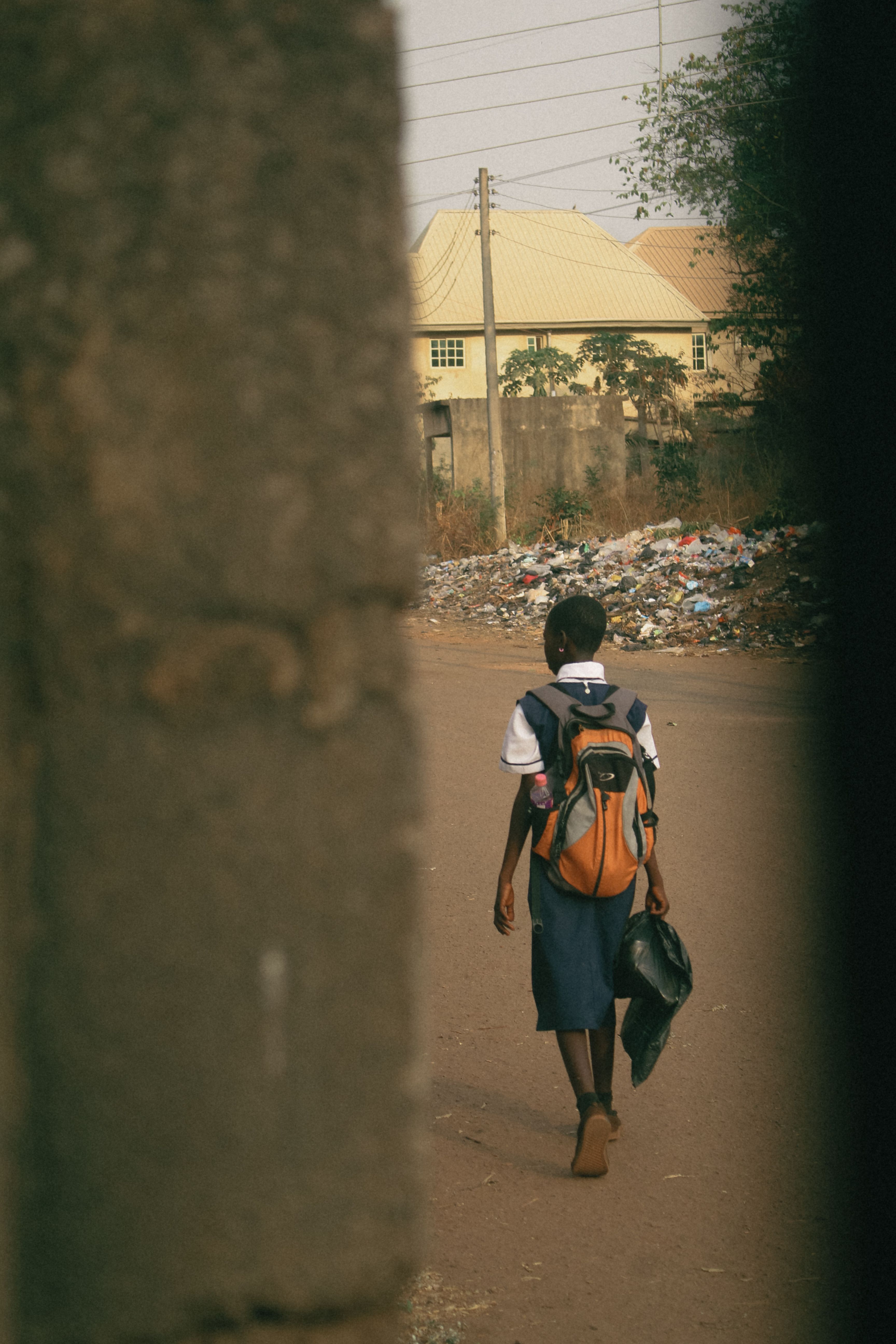 Child Walking Home in Enugu Nigeria · Free Stock Photo