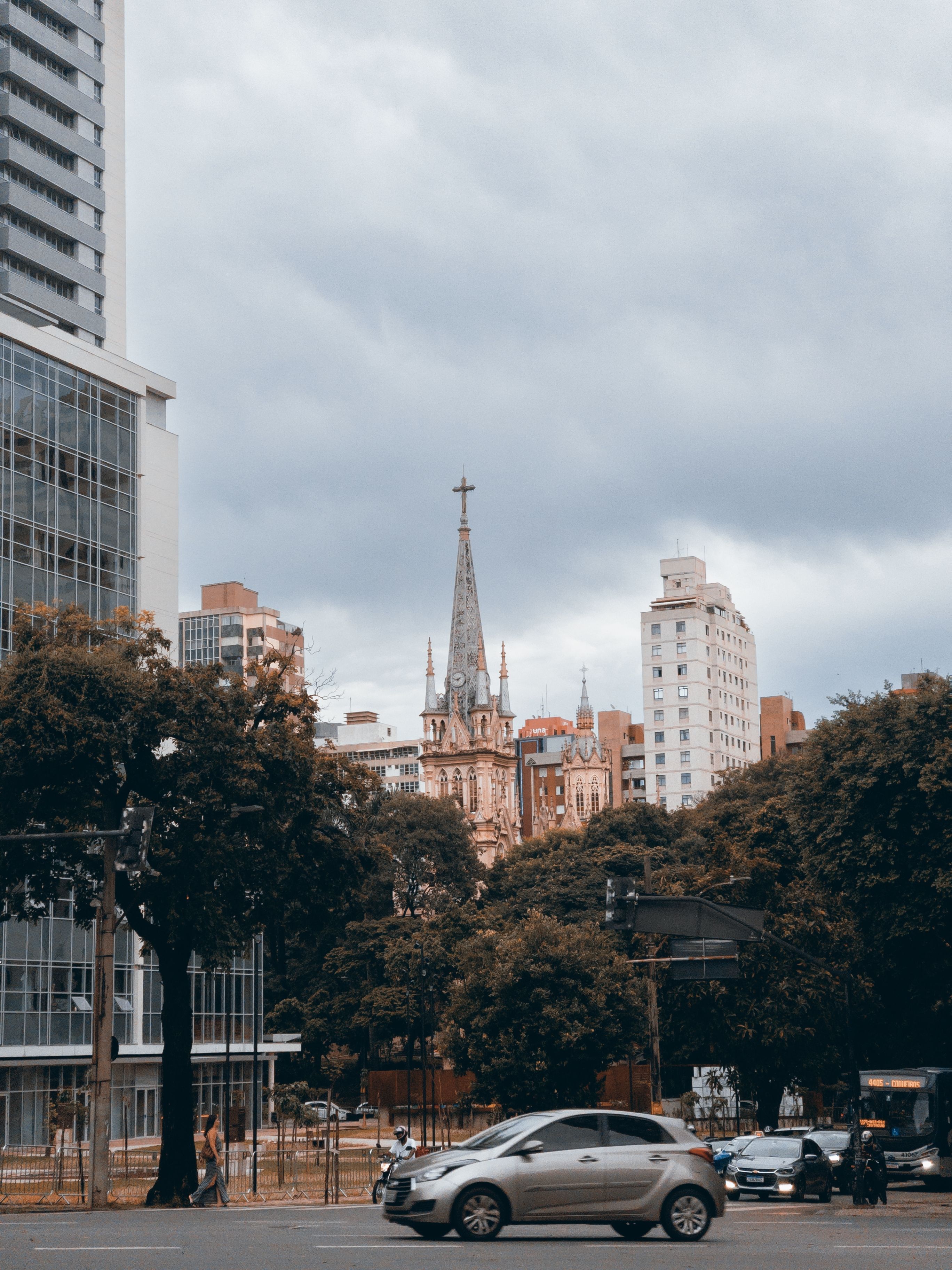 Neo-Gothic Church Amongst Modern Skyscrapers · Free Stock Photo