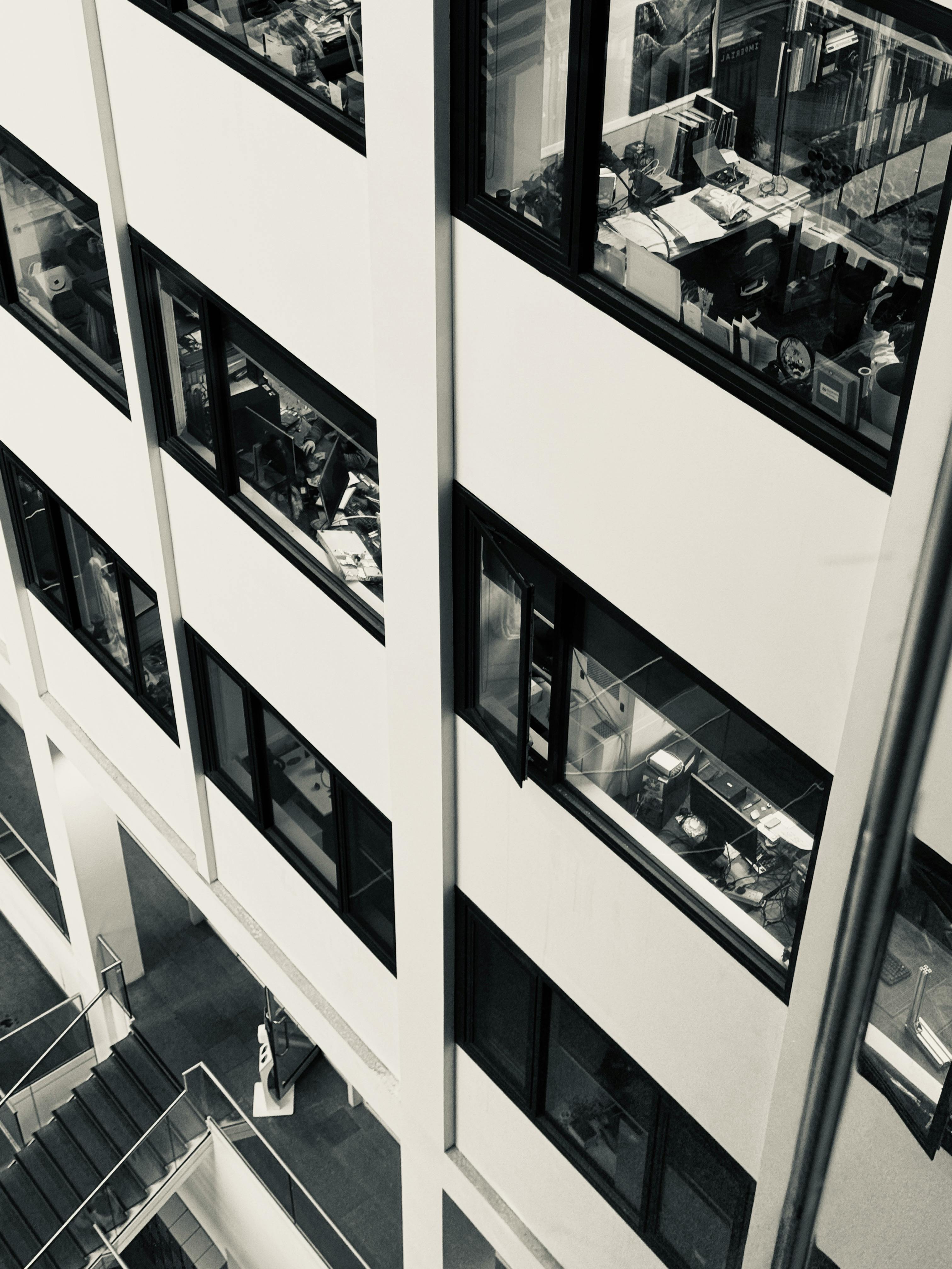 Aerial View of Busy Office Building Interior · Free Stock Photo