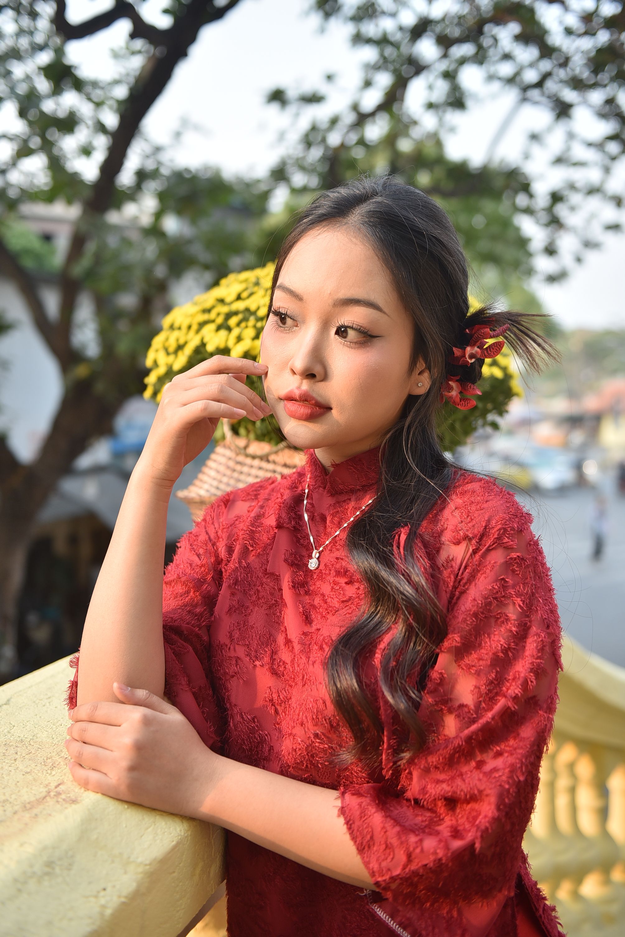 Elegant Woman in Traditional Red Dress Outdoors · Free Stock Photo