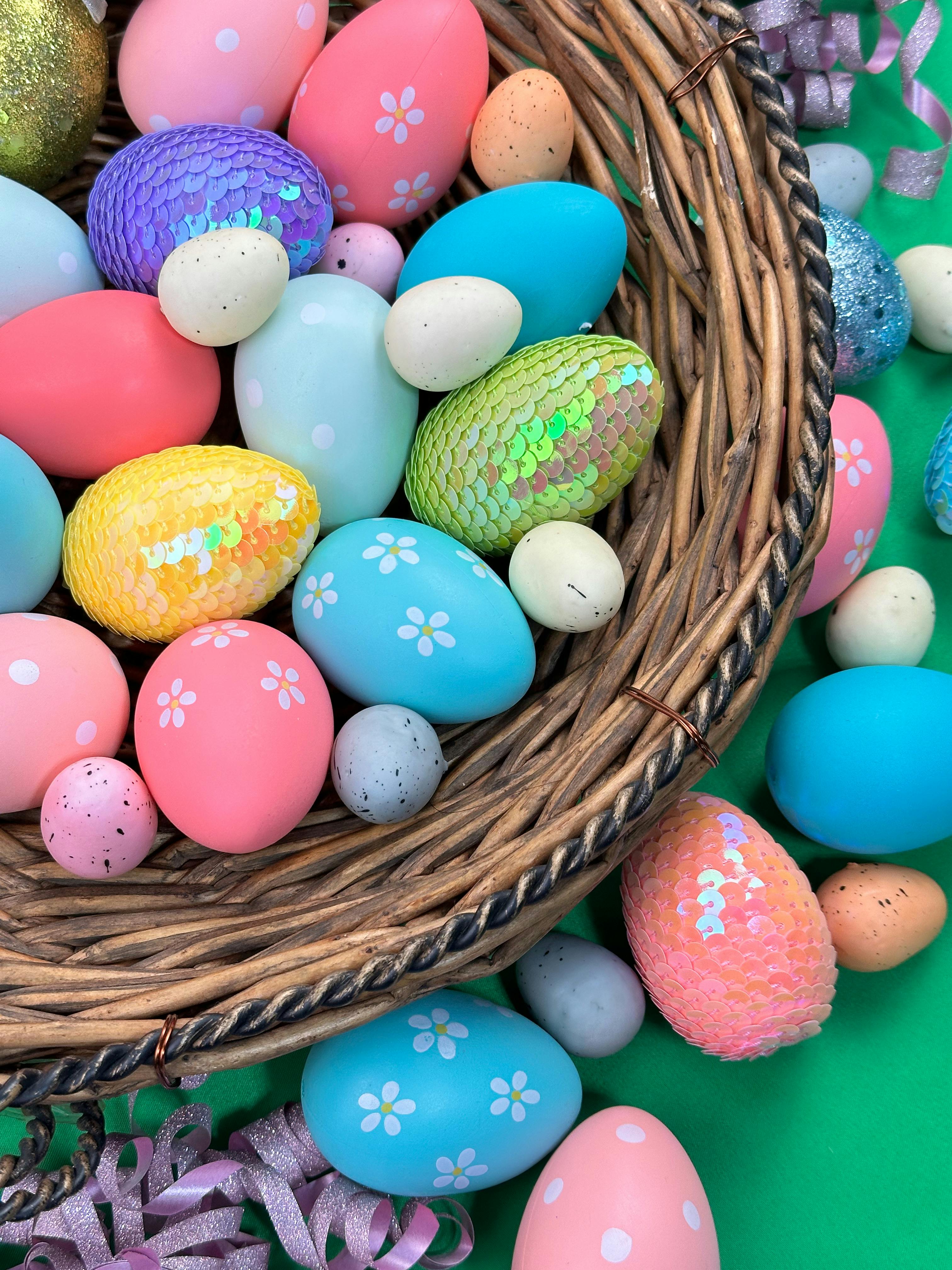 Colorful Easter Eggs in a Woven Basket · Free Stock Photo
