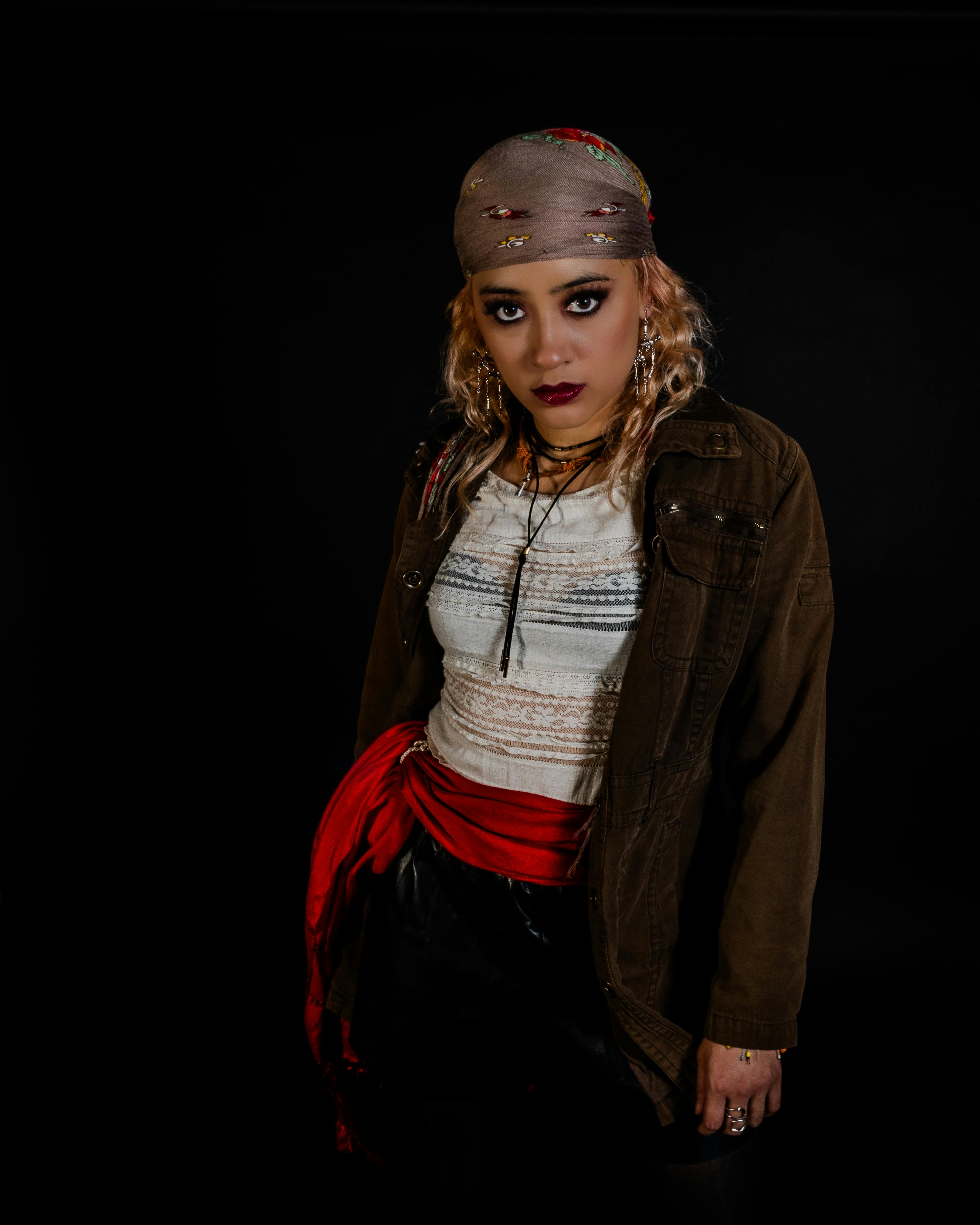 Expressive Female Portrait in Stylish Attire · Free Stock Photo