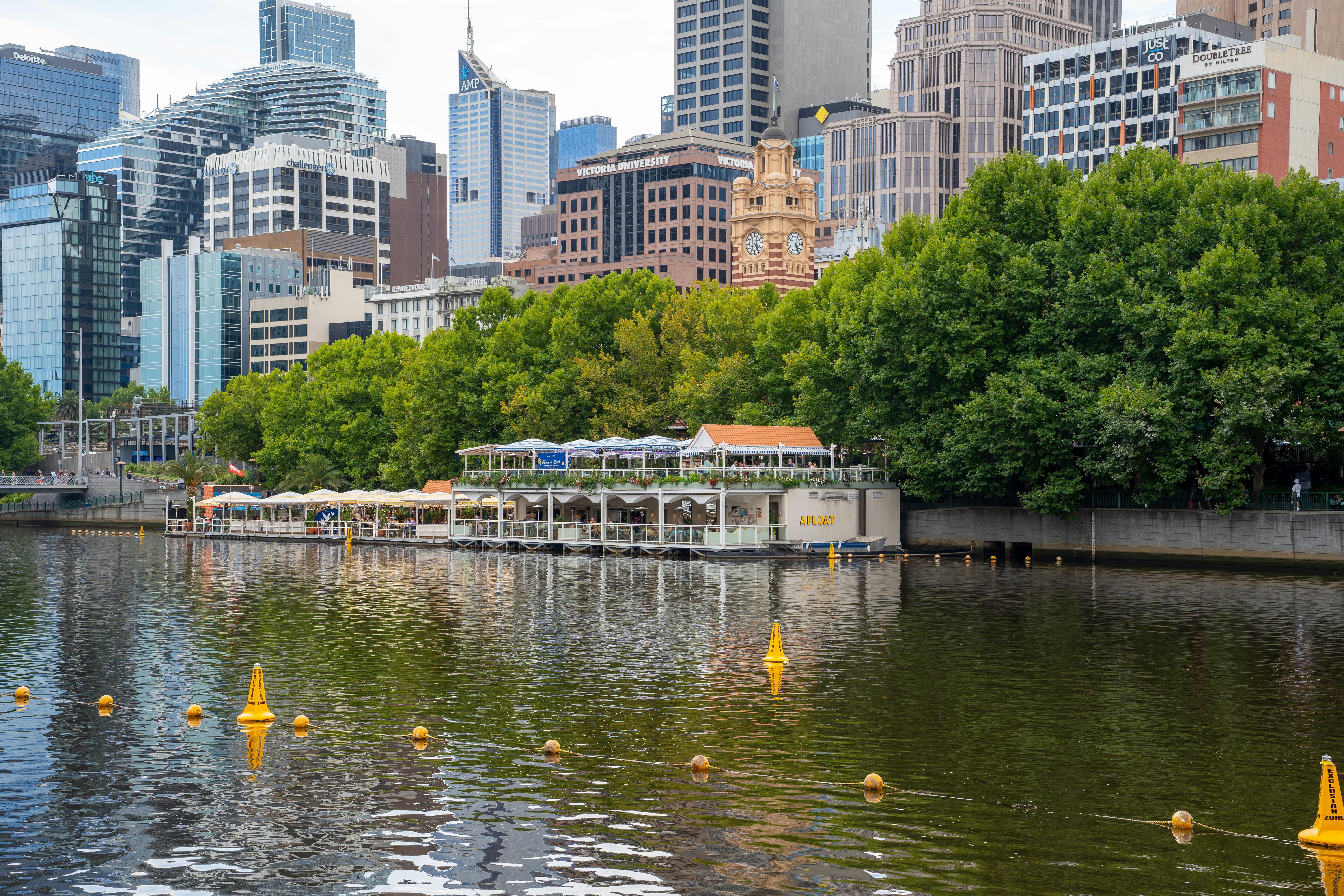 Melbourne Skyline by Yarra River with Afloat Bar · Free Stock Photo
