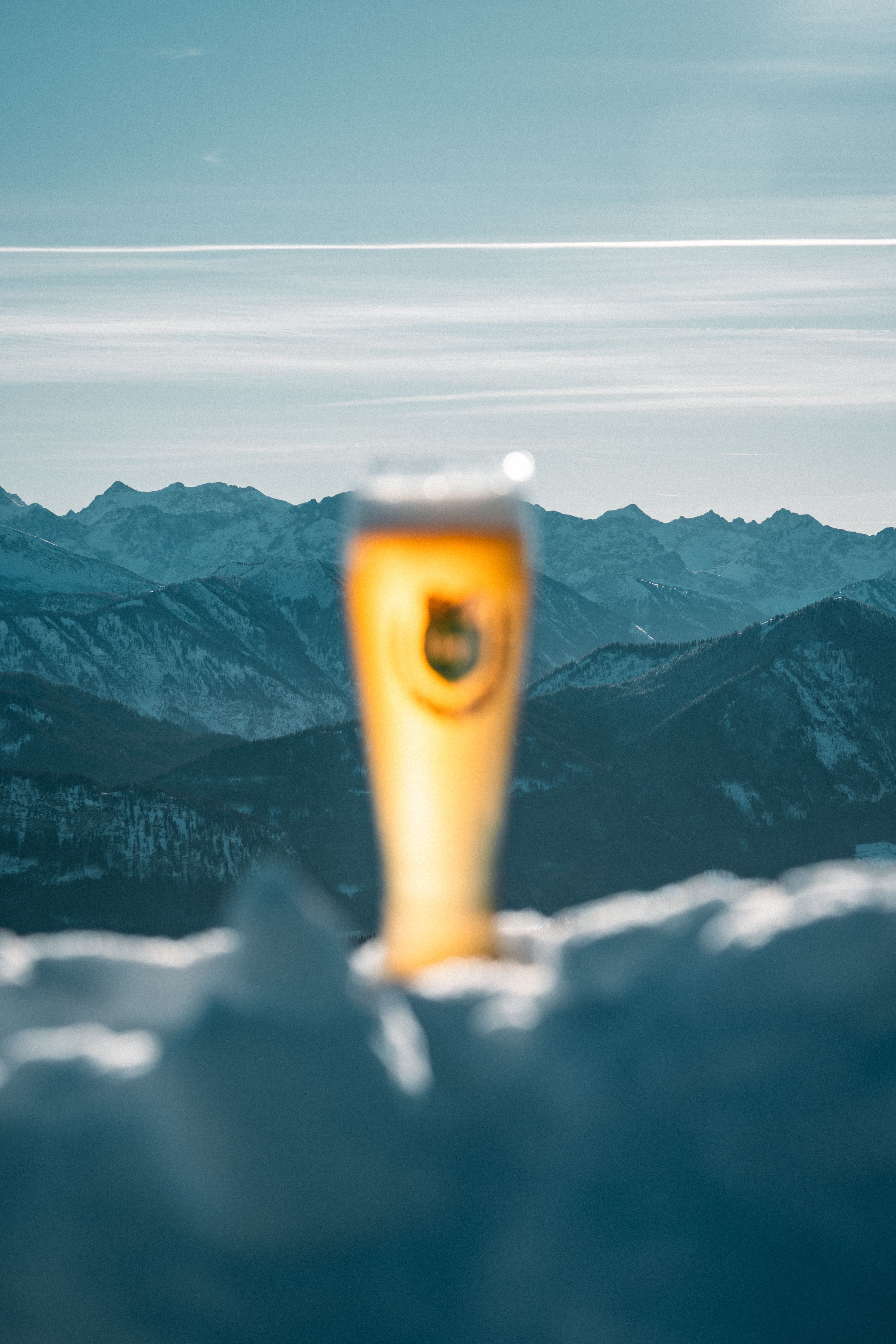 Refreshing Beer with Bavarian Alps Backdrop · Free Stock Photo