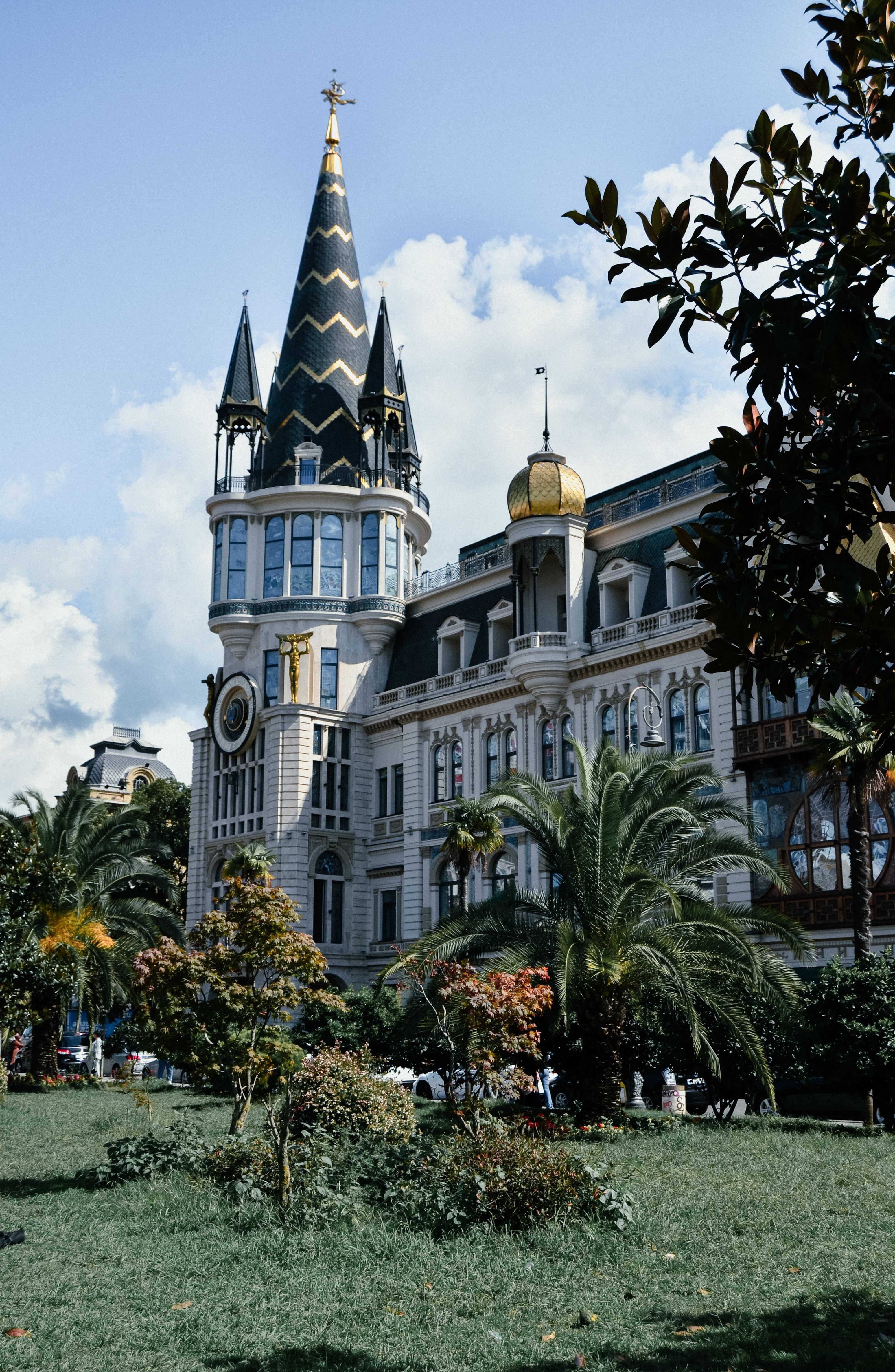 Gothic Revival Architecture in Lush Park Setting · Free Stock Photo