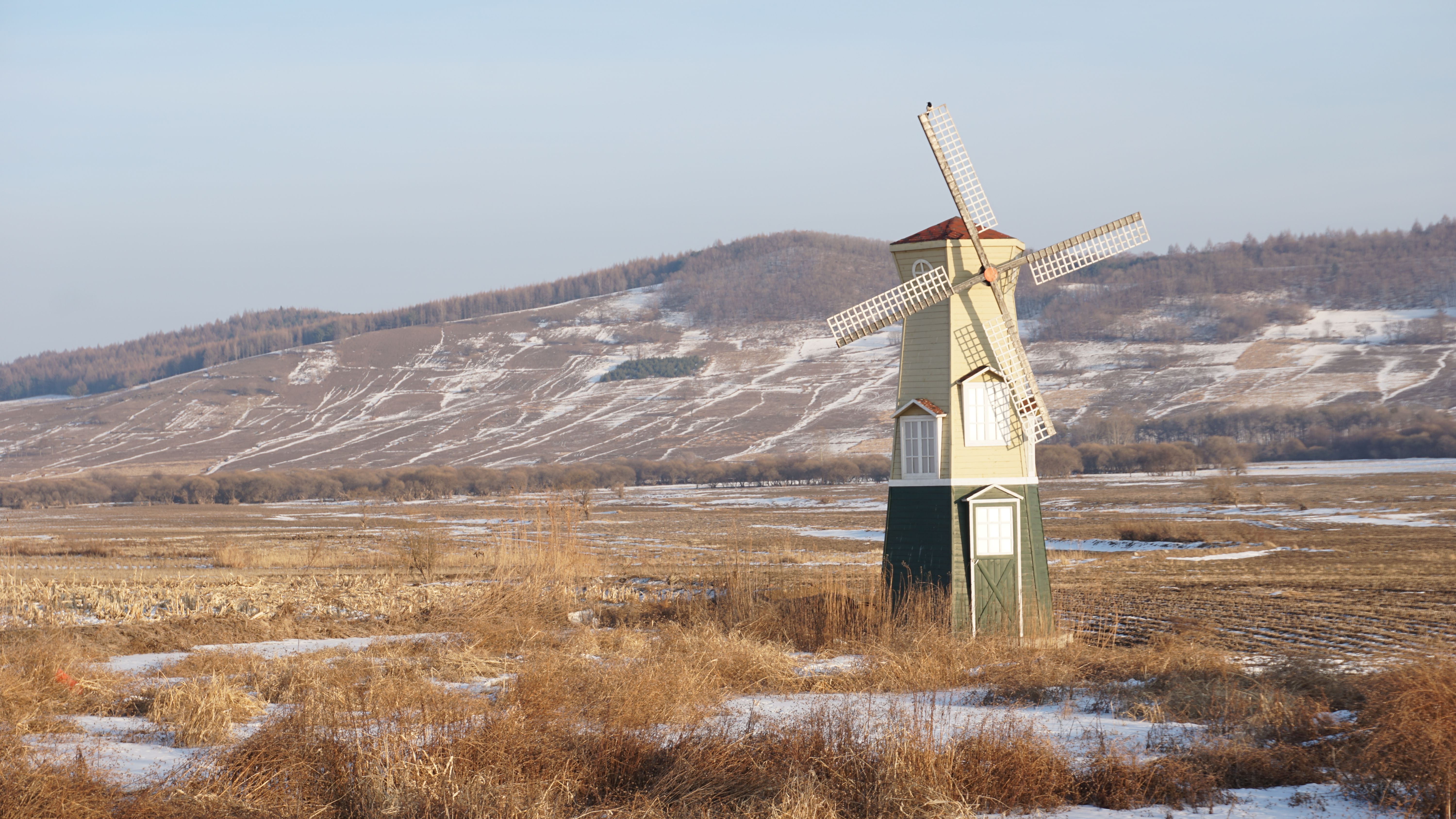 Historic Windmill in Snow-Covered Landscape · Free Stock Photo