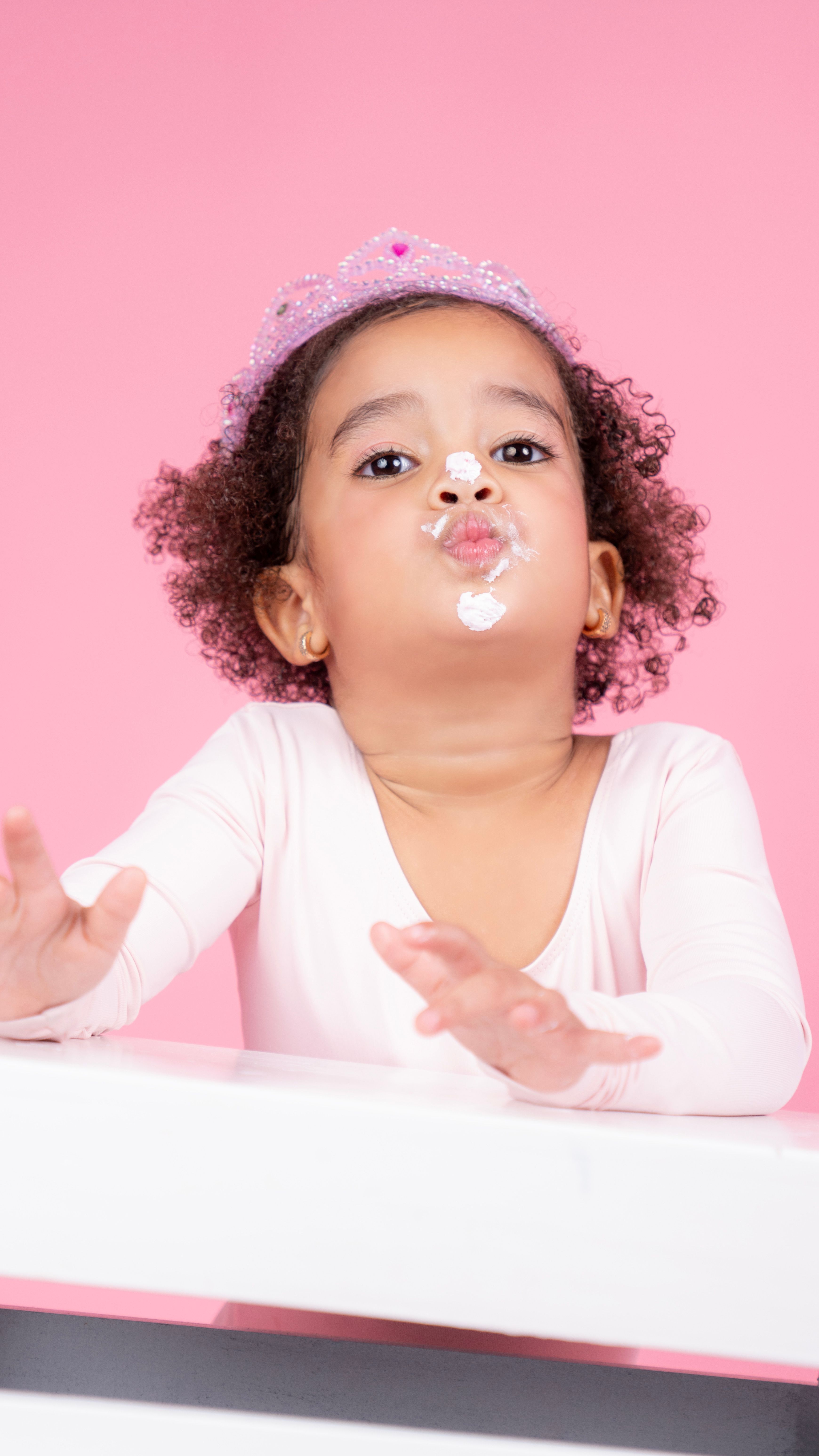 Adorable Child Celebrating with Frosted Face · Free Stock Photo
