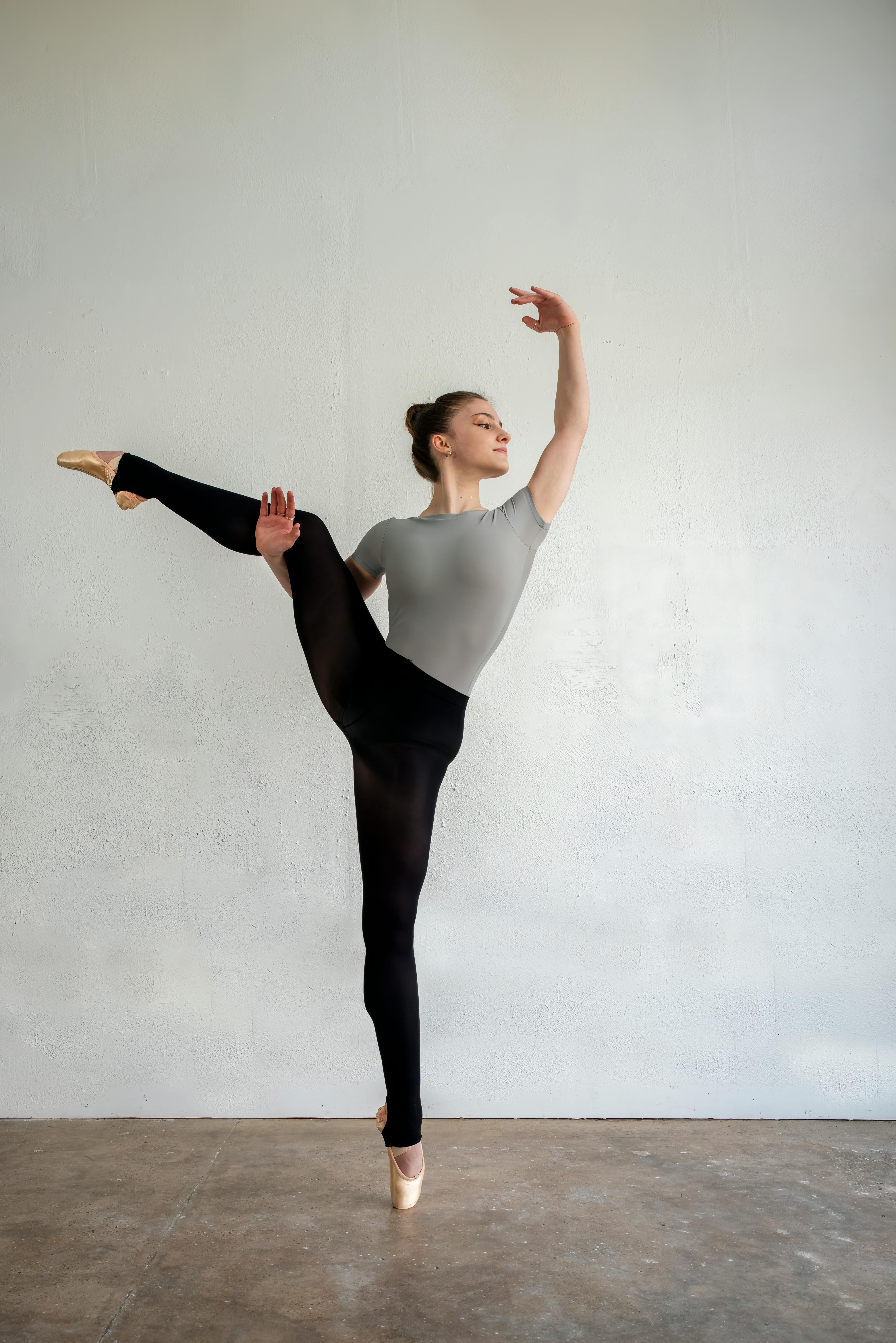 Graceful Ballet Dancer Performing Elegant Pose · Free Stock Photo
