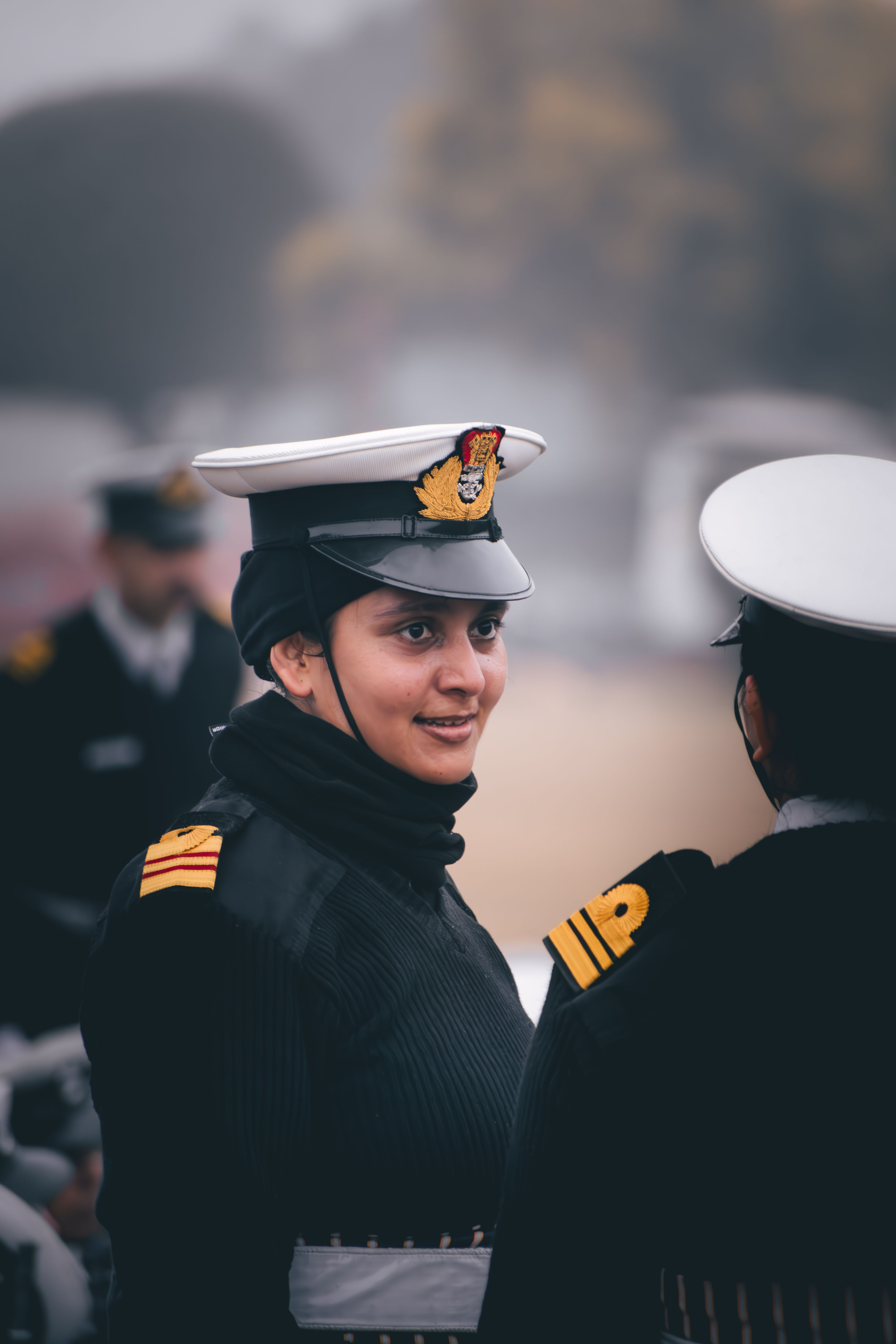 Female Naval Officers in Discussion Outdoors · Free Stock Photo