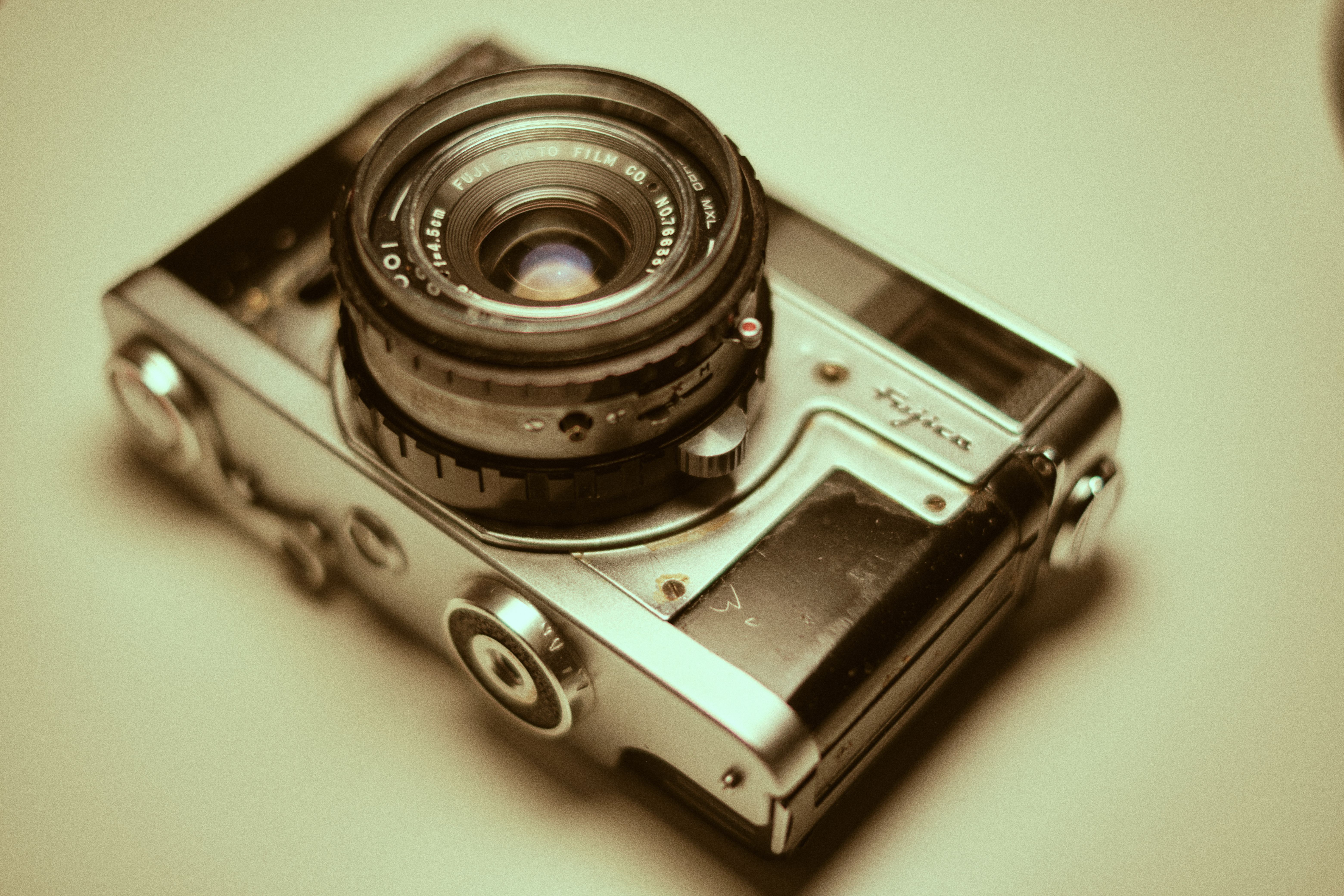 Vintage Film Camera on Neutral Background · Free Stock Photo