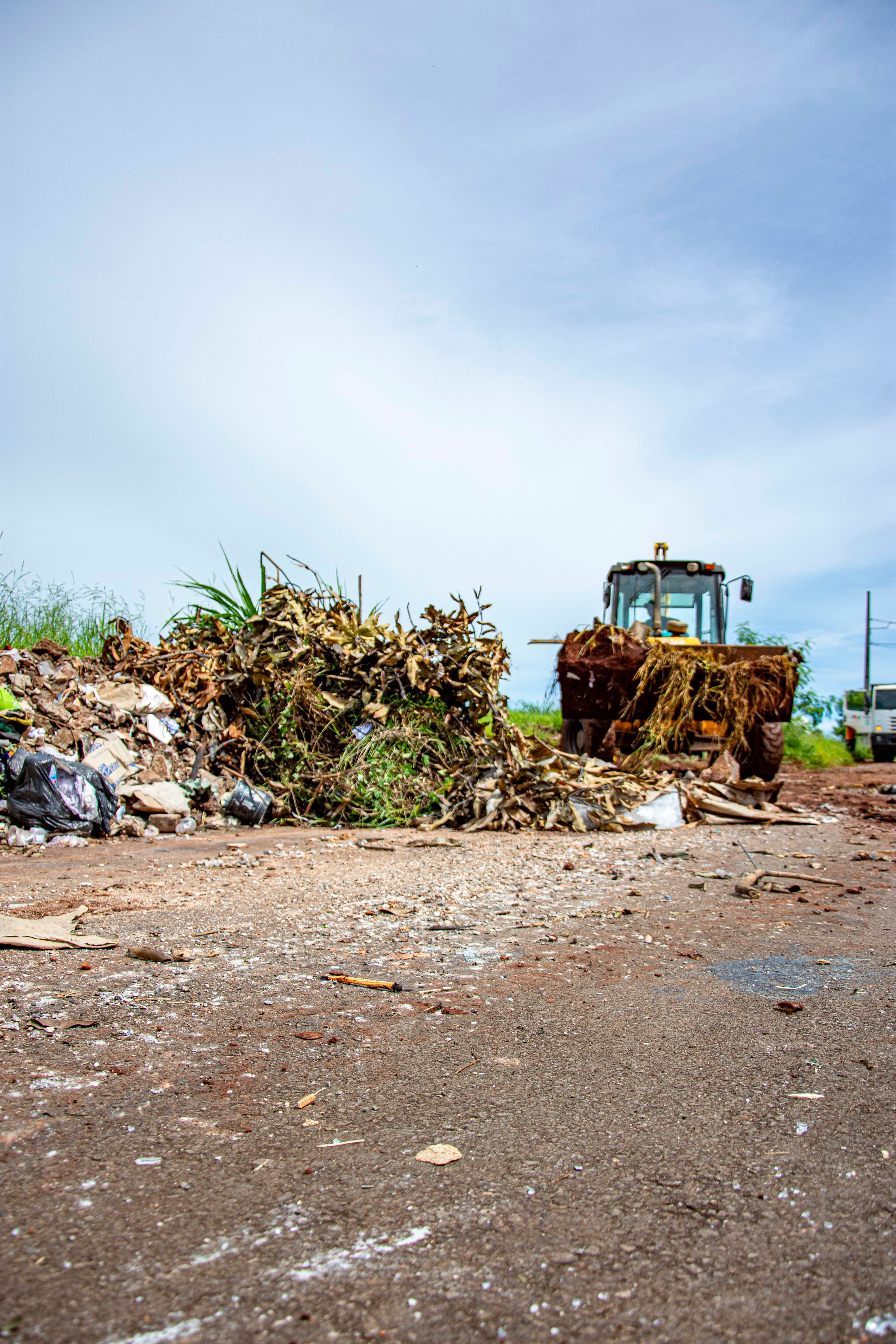 Heavy Equipment Clearing Debris on a Street · Free Stock Photo