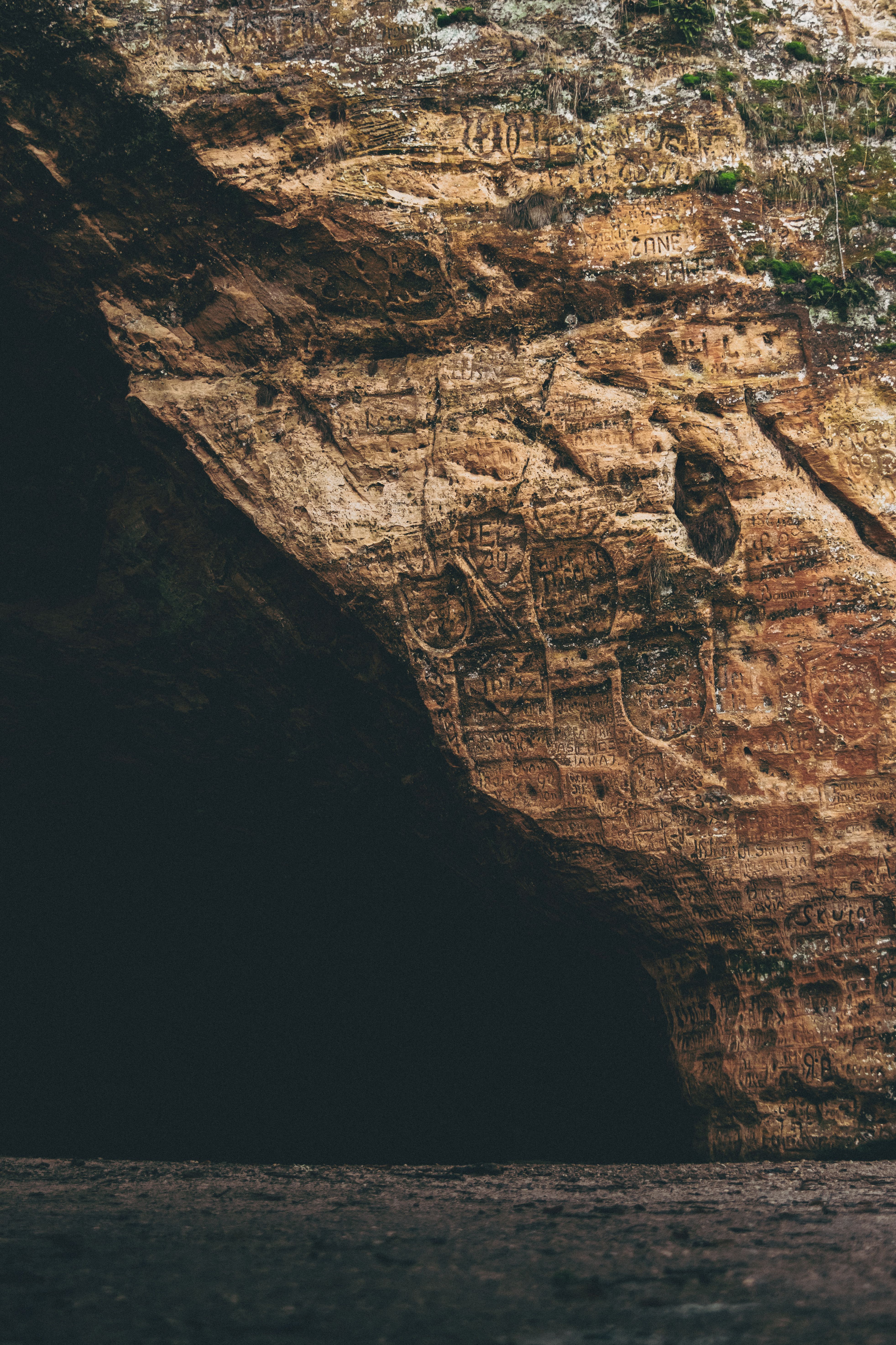 Natural Cliff Texture with Cave Entrance · Free Stock Photo