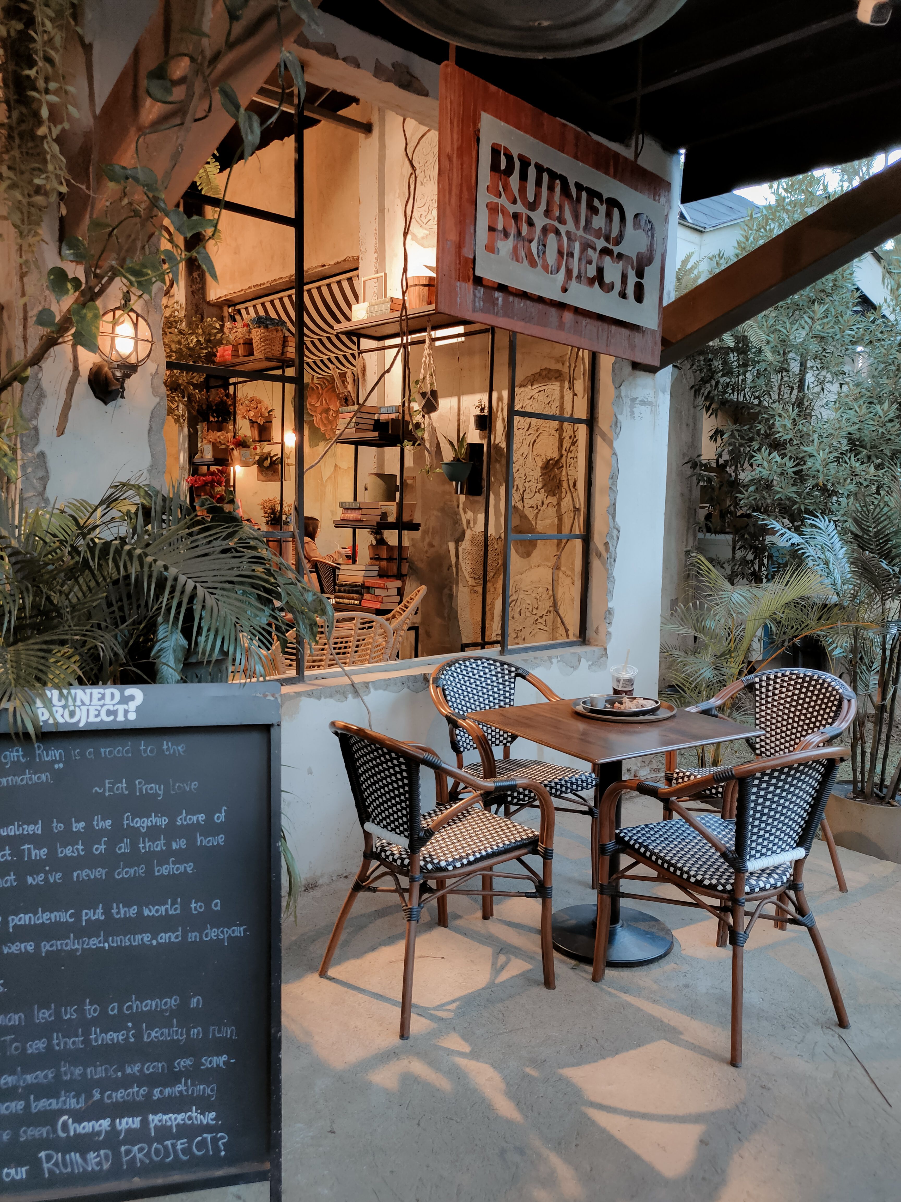 Charming Outdoor Cafe with Rustic Decor · Free Stock Photo