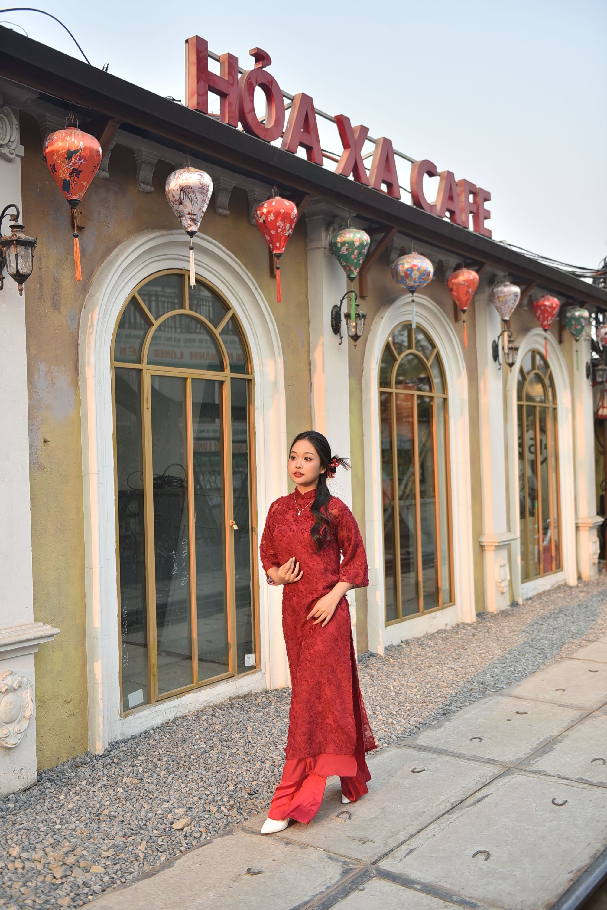 Woman in Red Traditional Dress at Vietnamese Cafe · Free Stock Photo