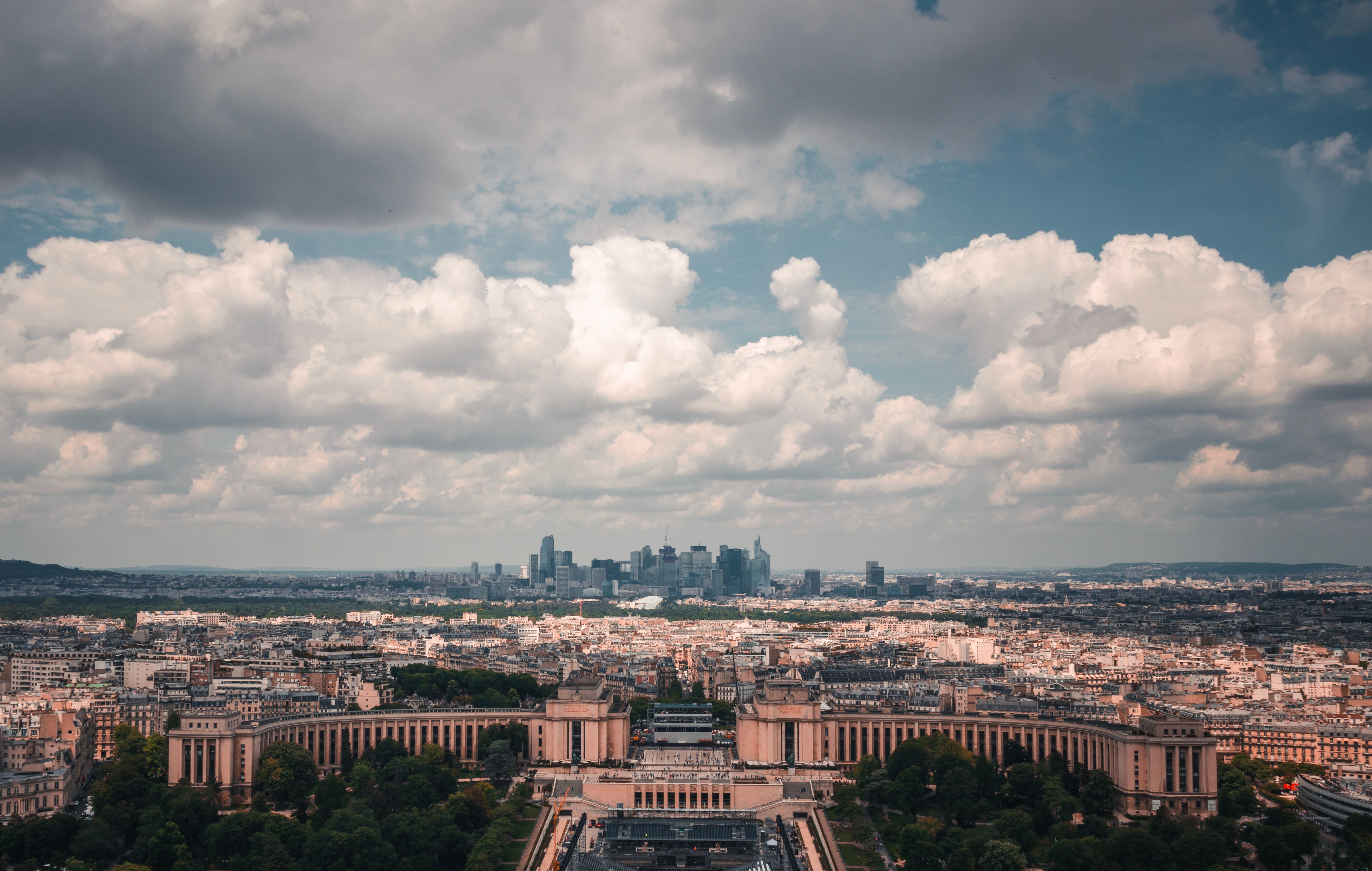 Aerial View of Paris Skyline with Cloudy Sky · Free Stock Photo