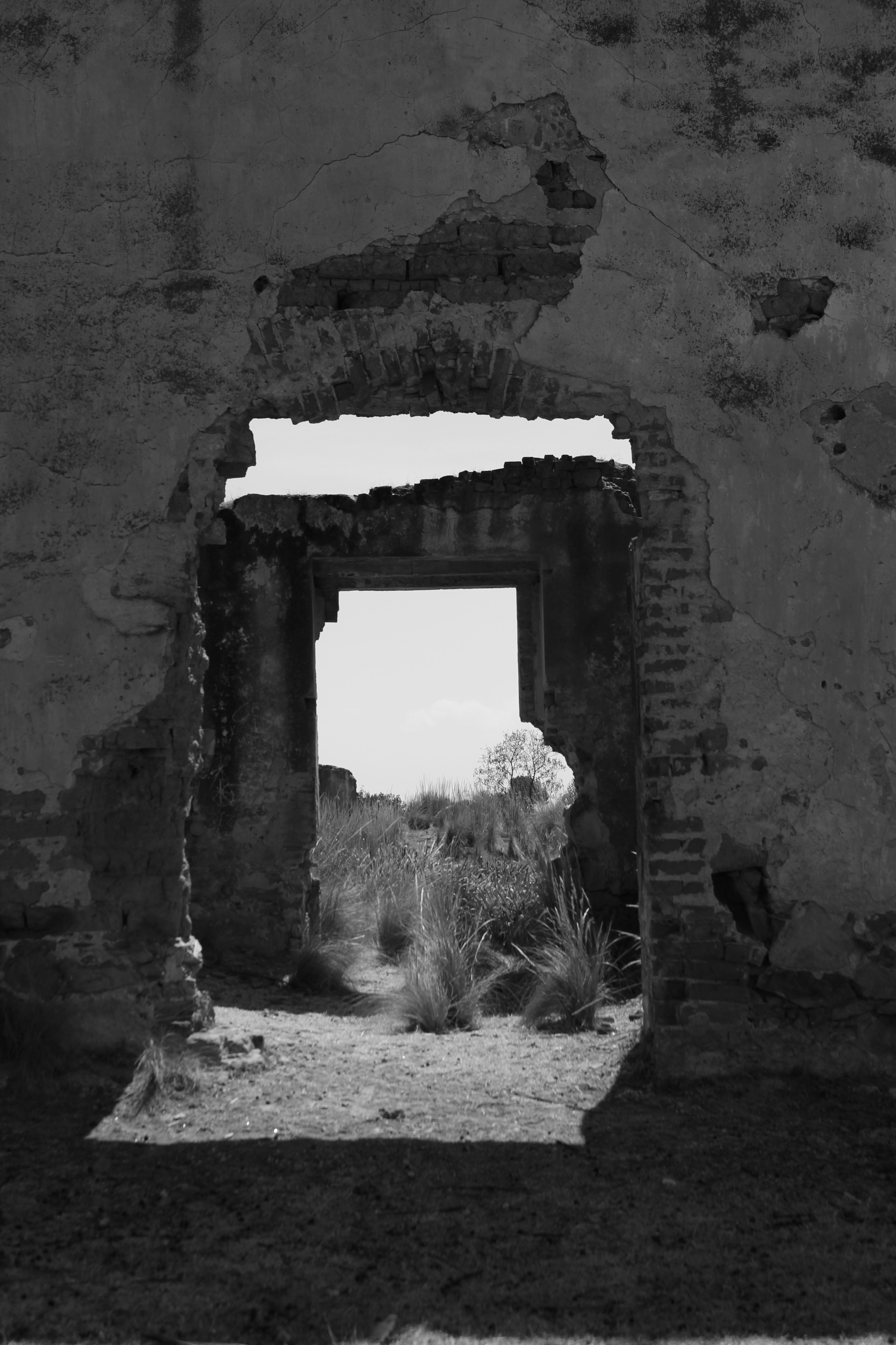 Historic Ruins with Arches and Sunlight Shadows · Free Stock Photo