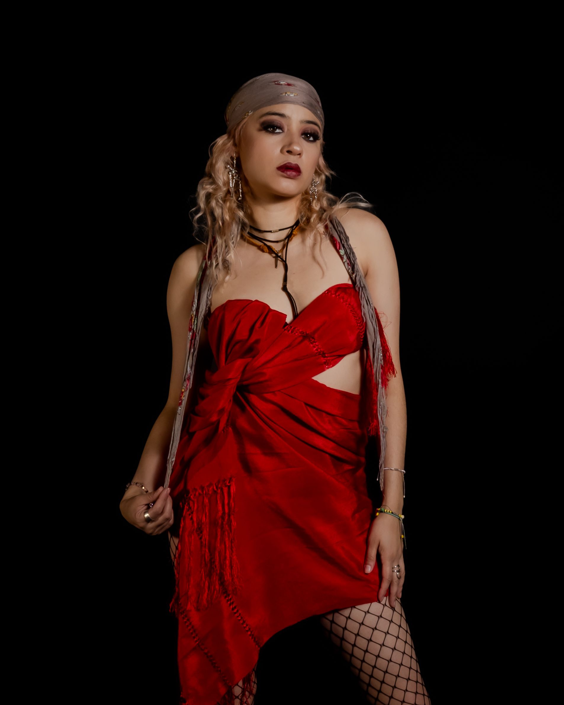 Expressive Female Portrait in Red Dress · Free Stock Photo
