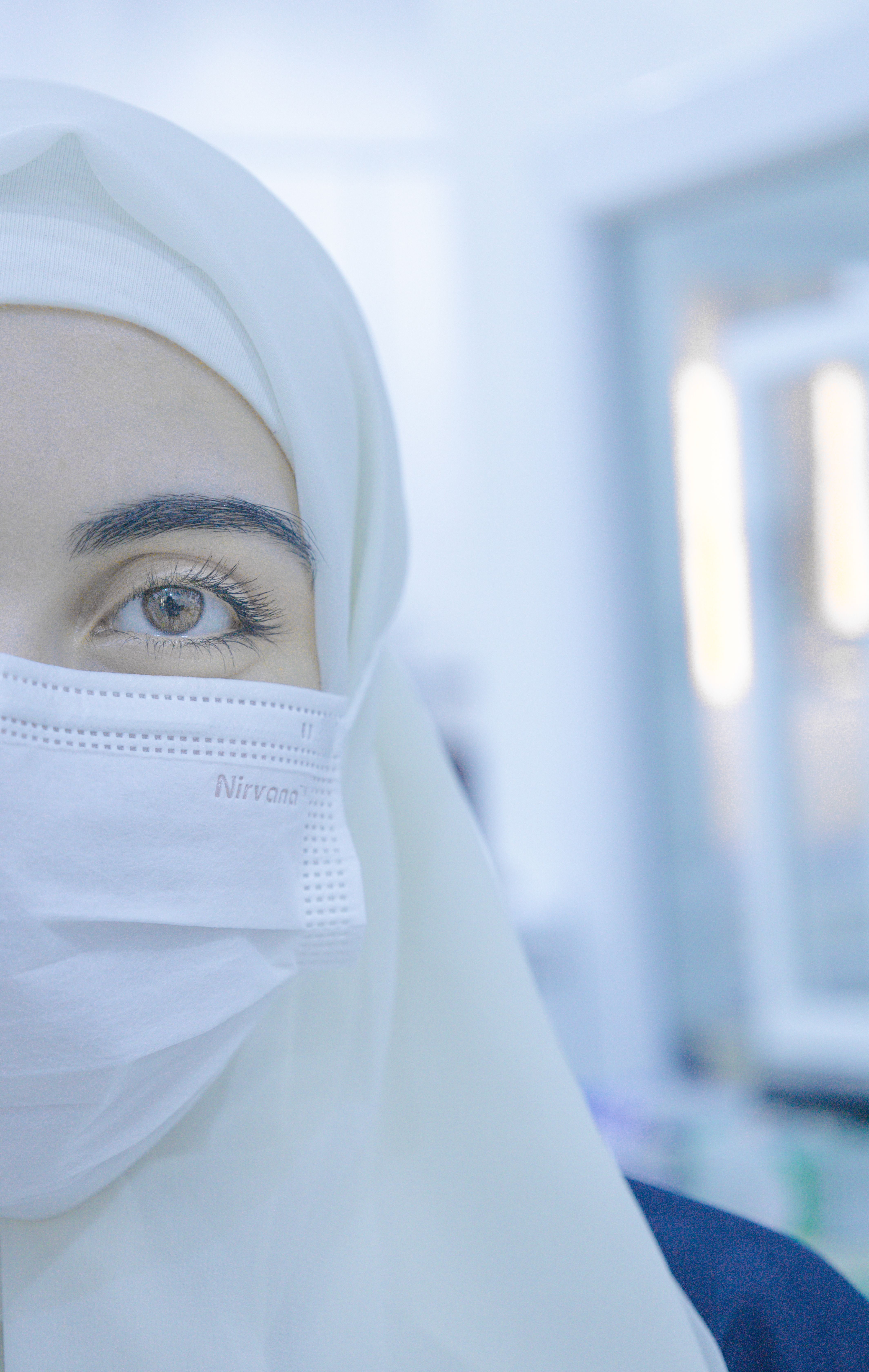 Middle Eastern Woman Wearing Hijab and Face Mask · Free Stock Photo