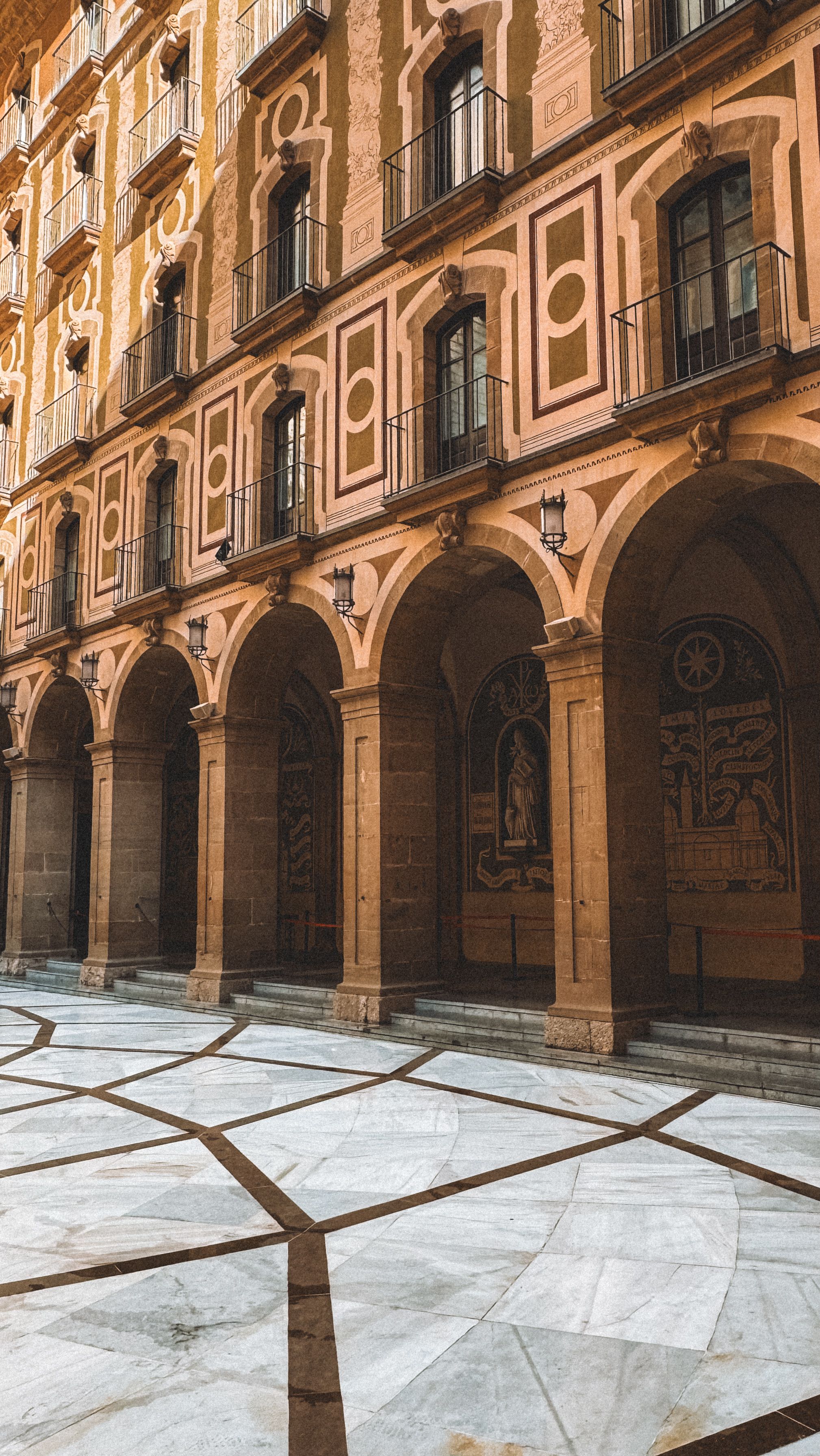 Historic Spanish Architecture with Arches · Free Stock Photo