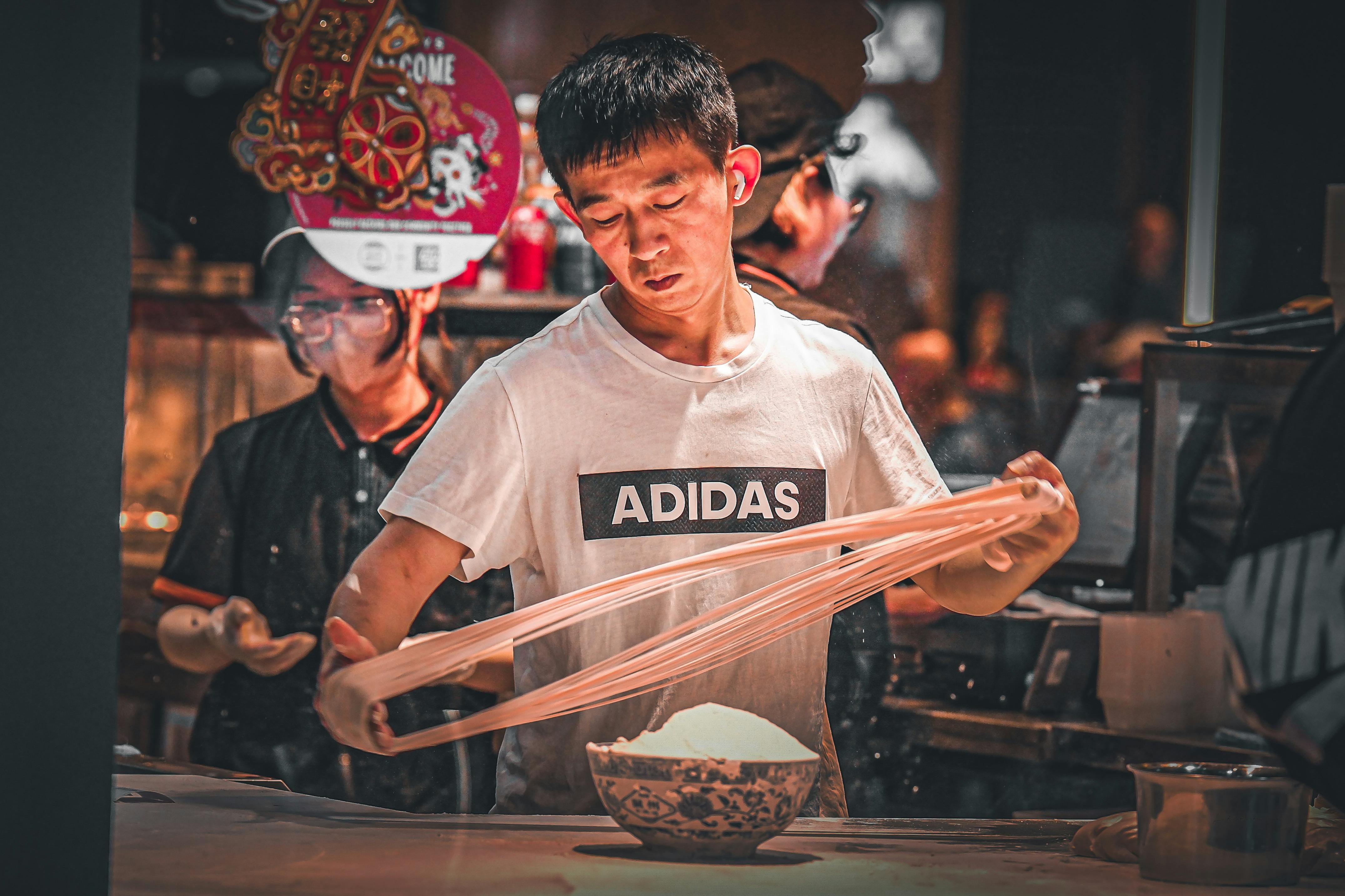 Skilled Chef Making Traditional Noodles Indoors · Free Stock Photo