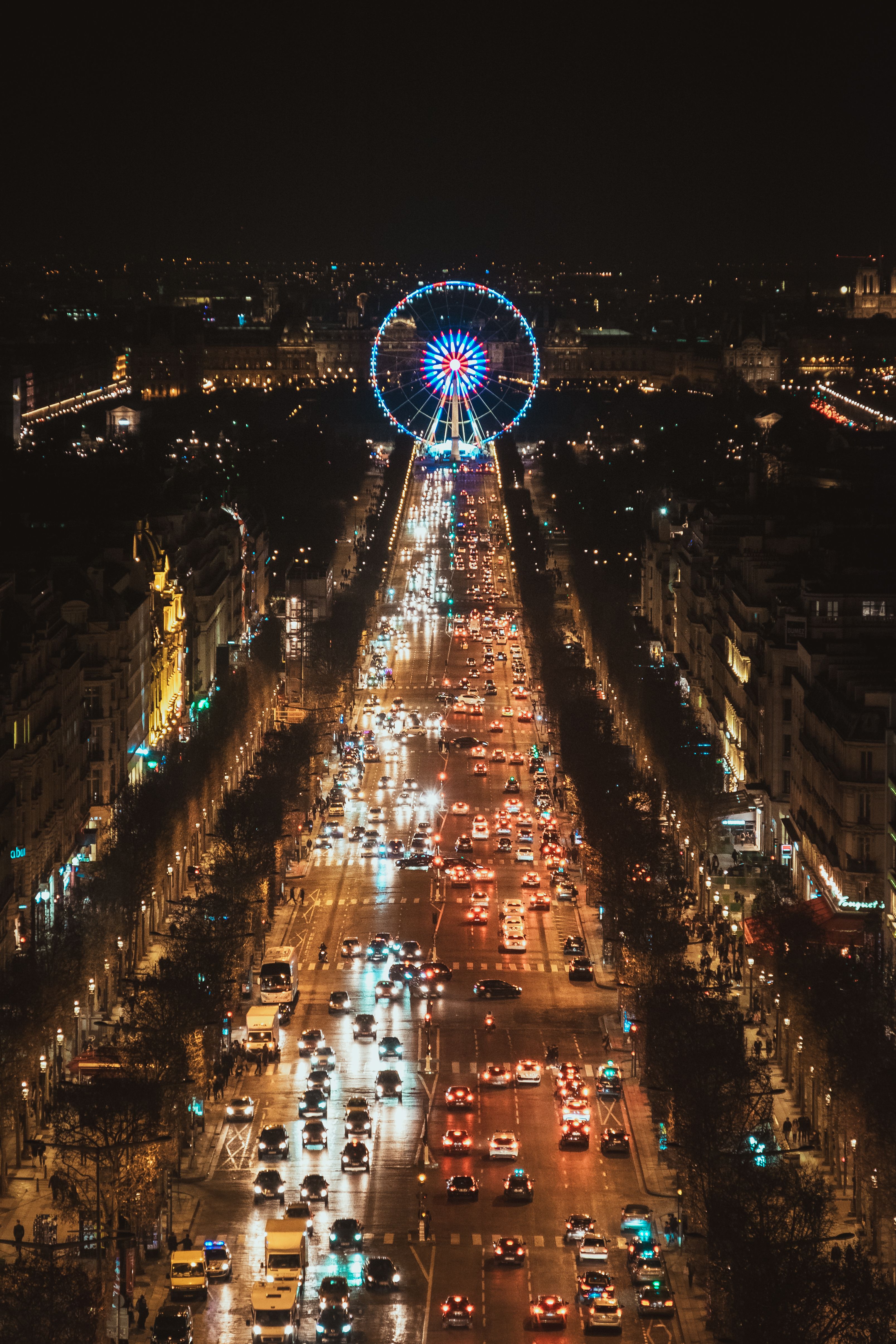 Iconic Parisian Night View with Ferris Wheel · Free Stock Photo