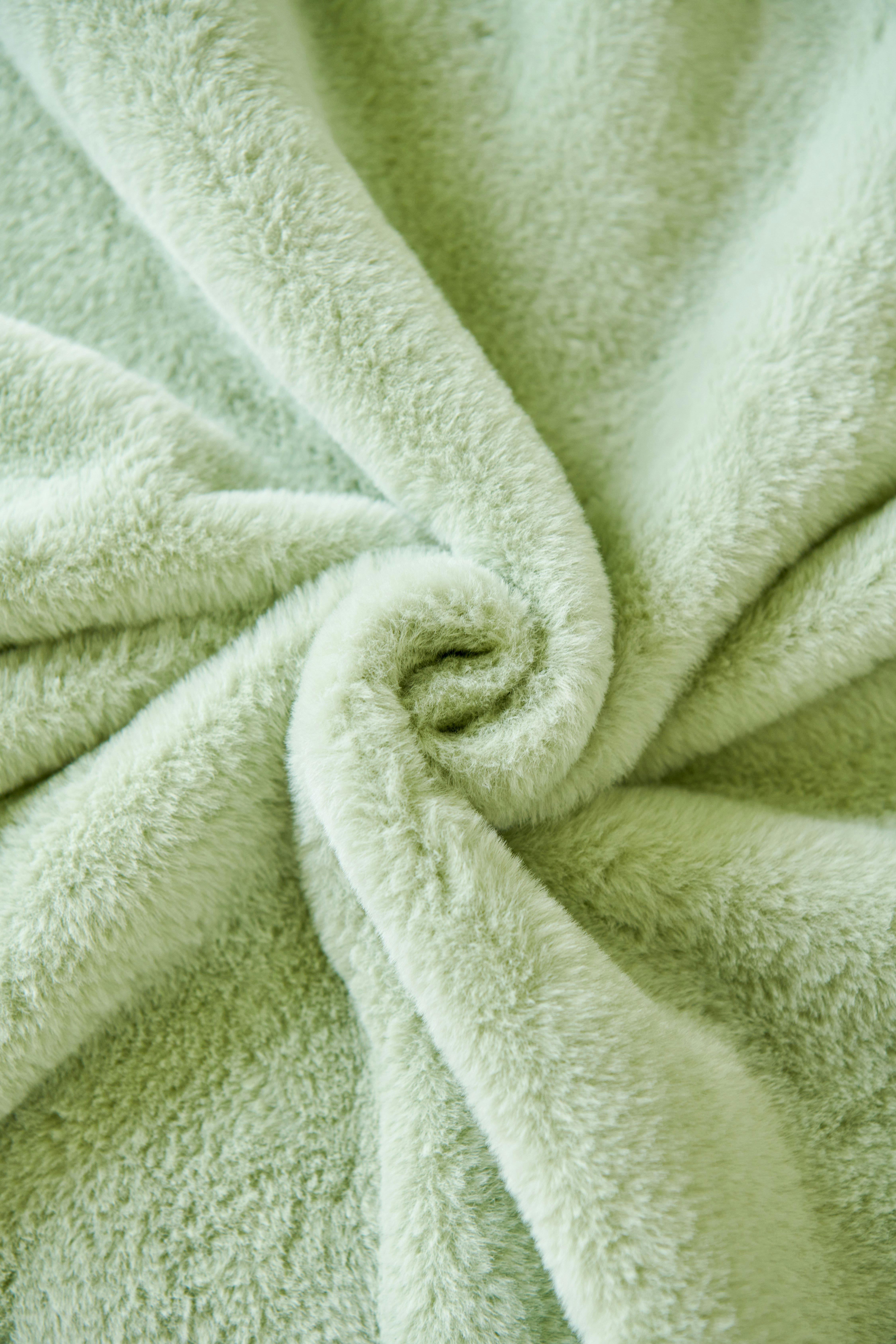 Soft Green Textured Fabric Close-up · Free Stock Photo