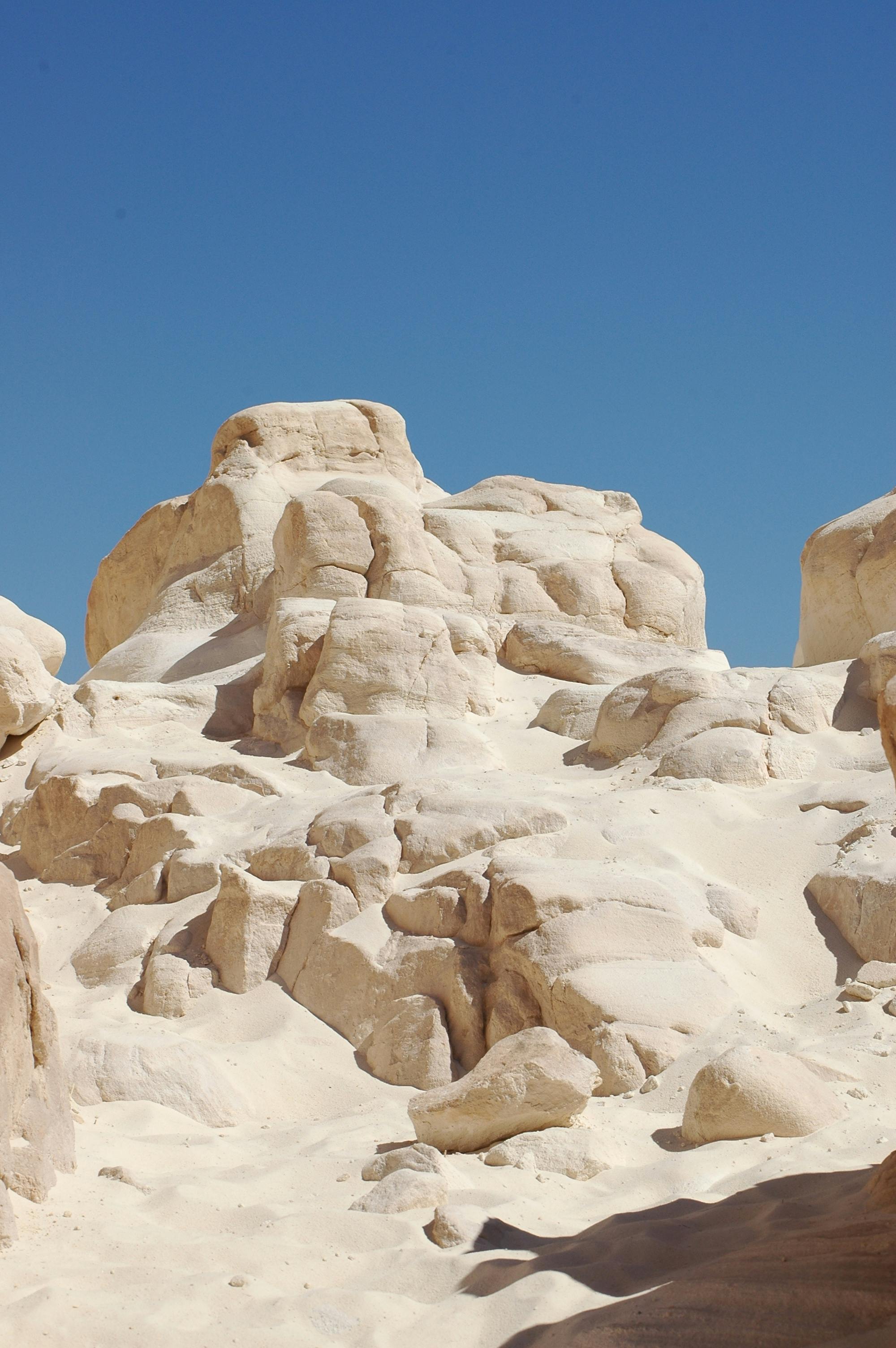 Scenic White Desert Rock Formations under Blue Sky · Free Stock Photo