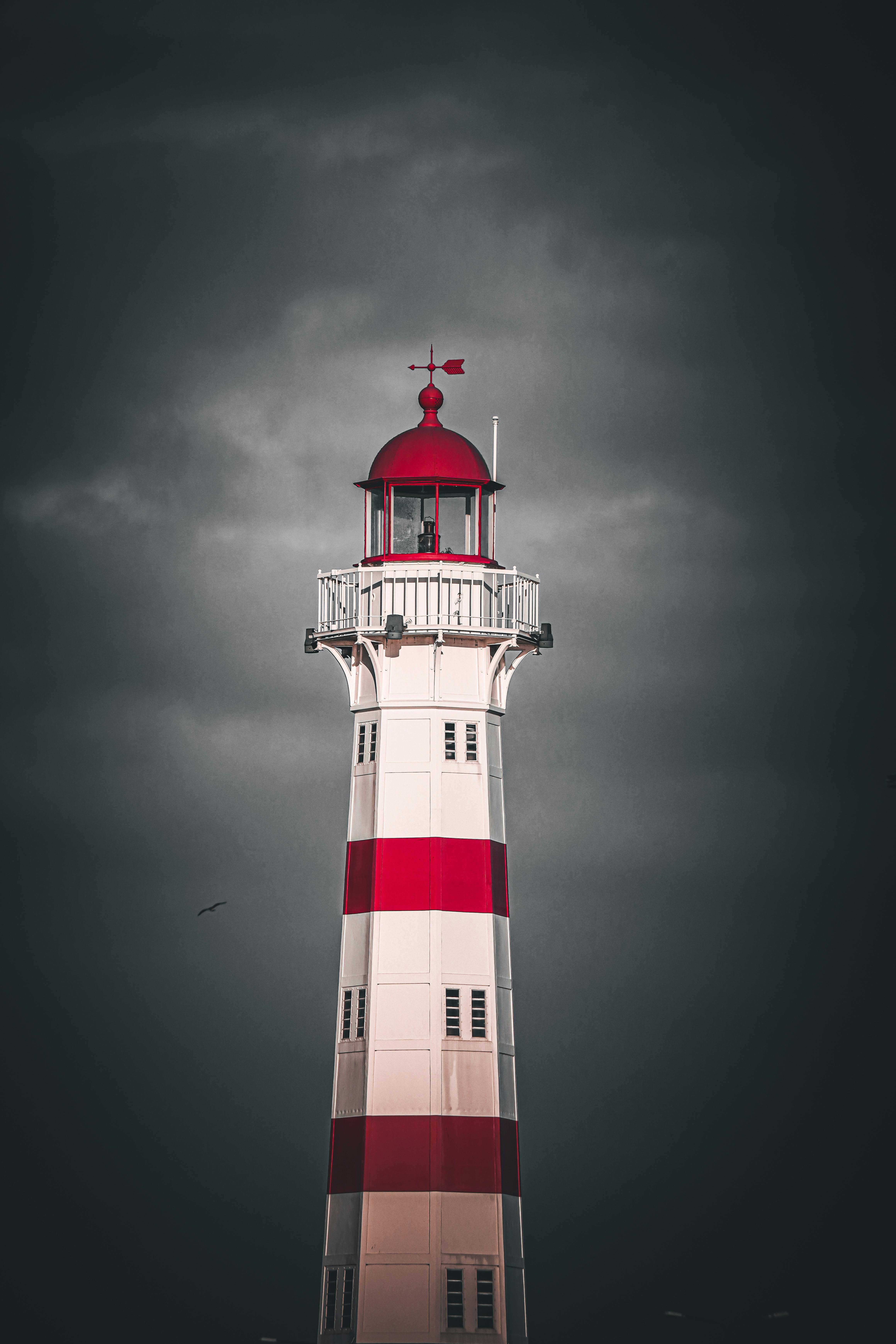 Dramatic Red and White Lighthouse in Malmö, Sweden · Free Stock Photo