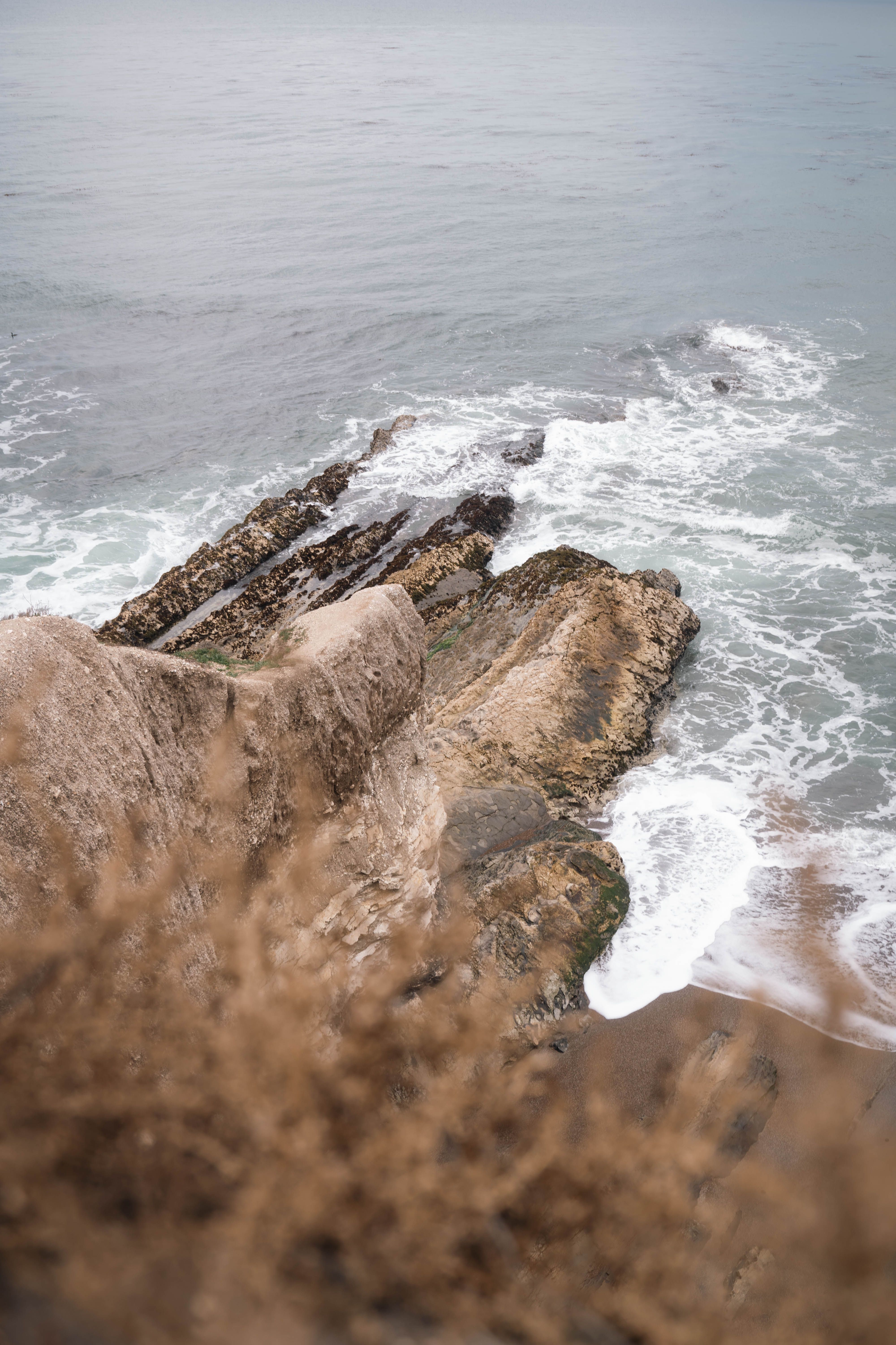 Dramatic Coastal Cliffs Overlooking the Ocean · Free Stock Photo